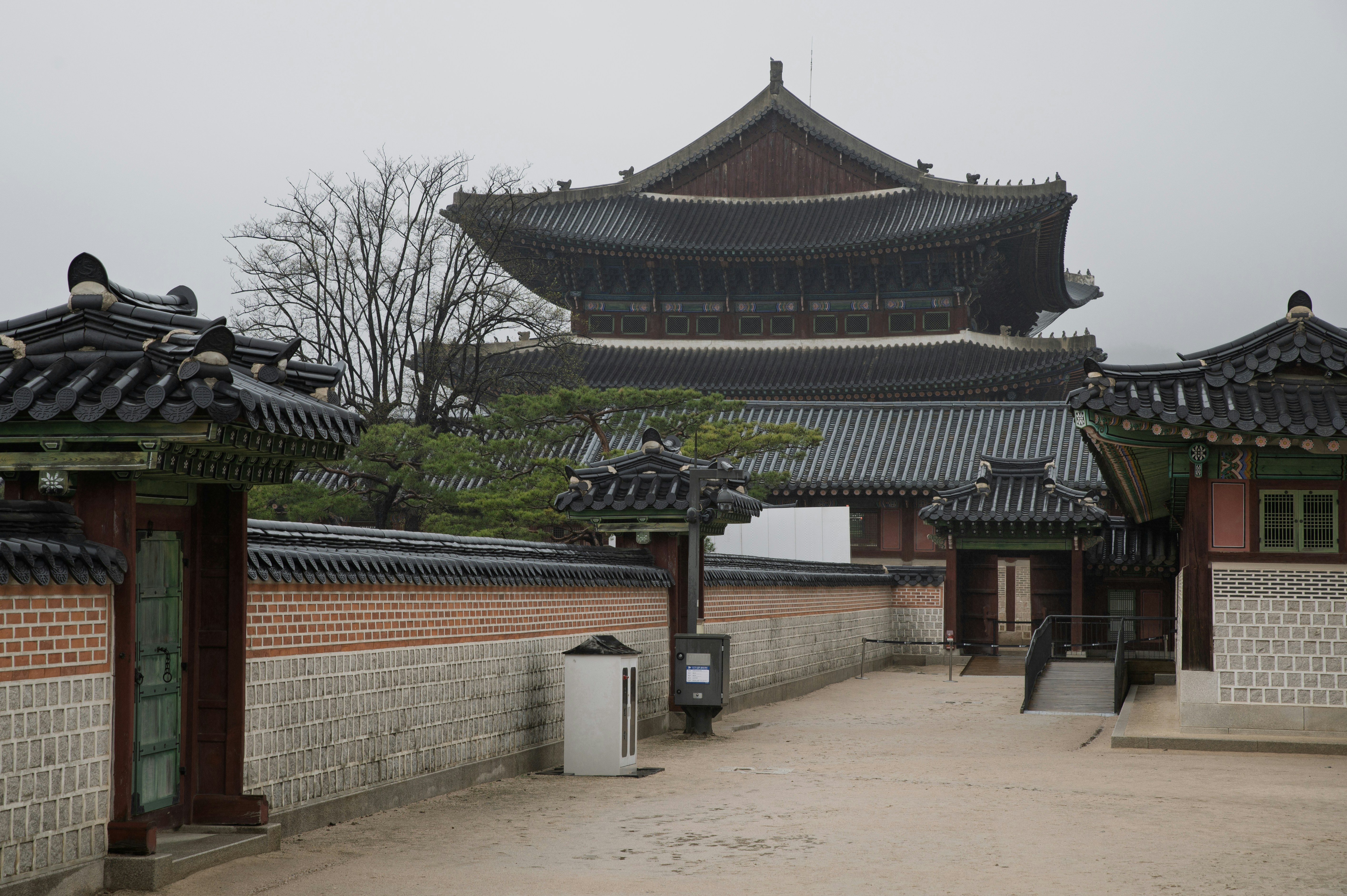 Gateway to a Hidden Courtyard: The Curved Roofs and Timeless Stone