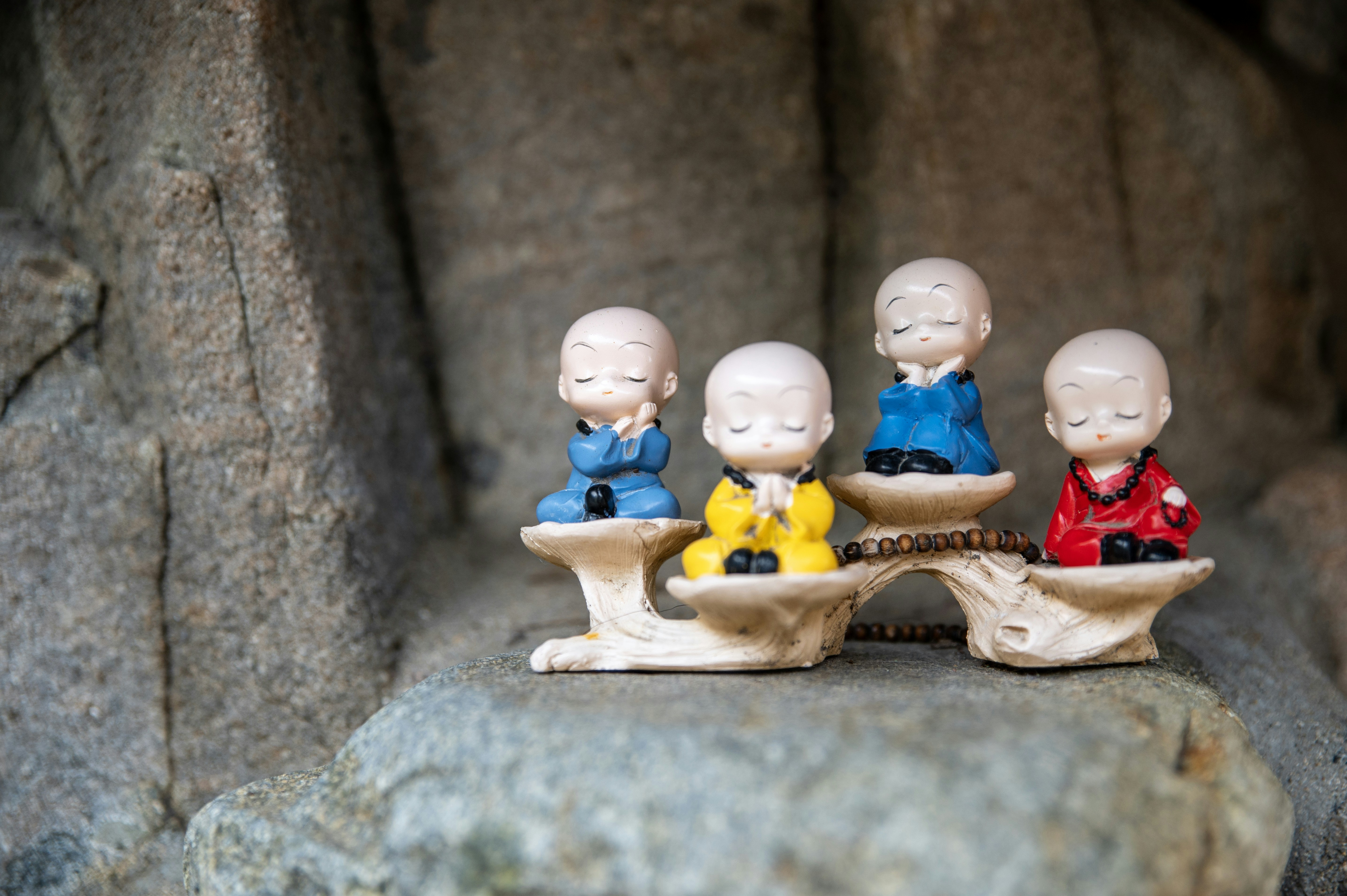Mini Monk Assembly on a Stone Altar