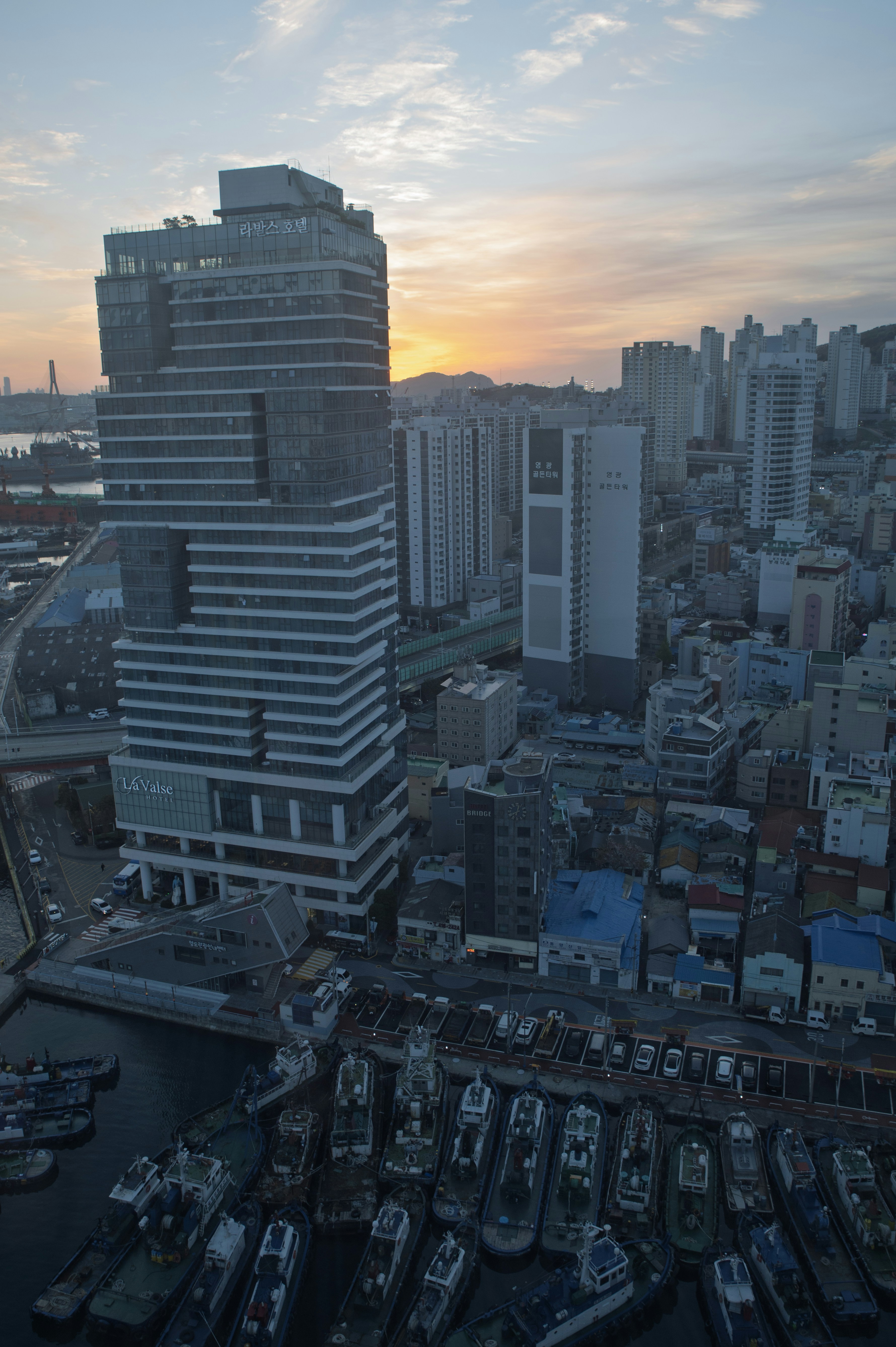 Sunset Over the Vertical City and Maritime Marina