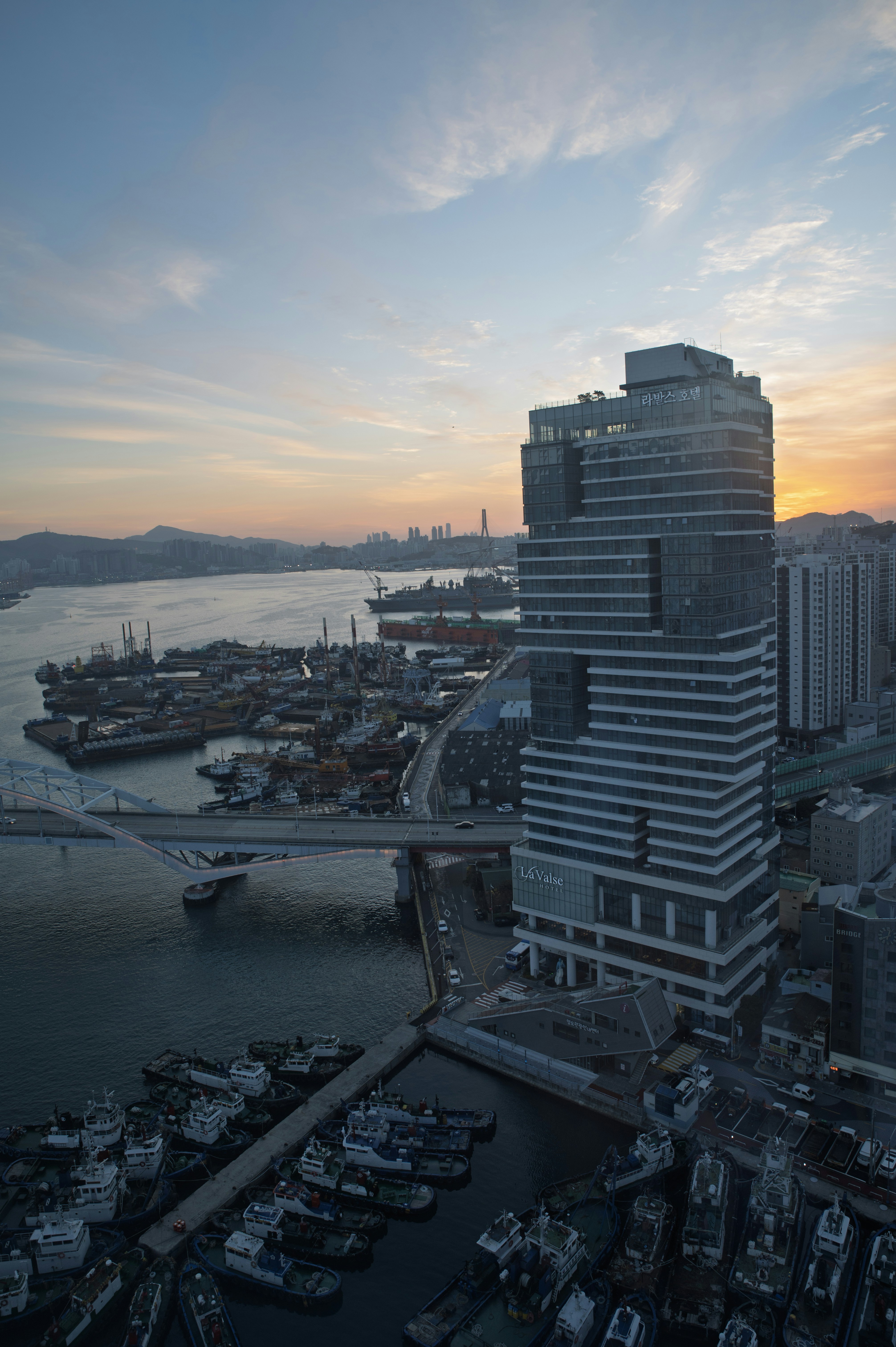 Harbor Skyline at Dusk: A Tower Overlooking the Fleet