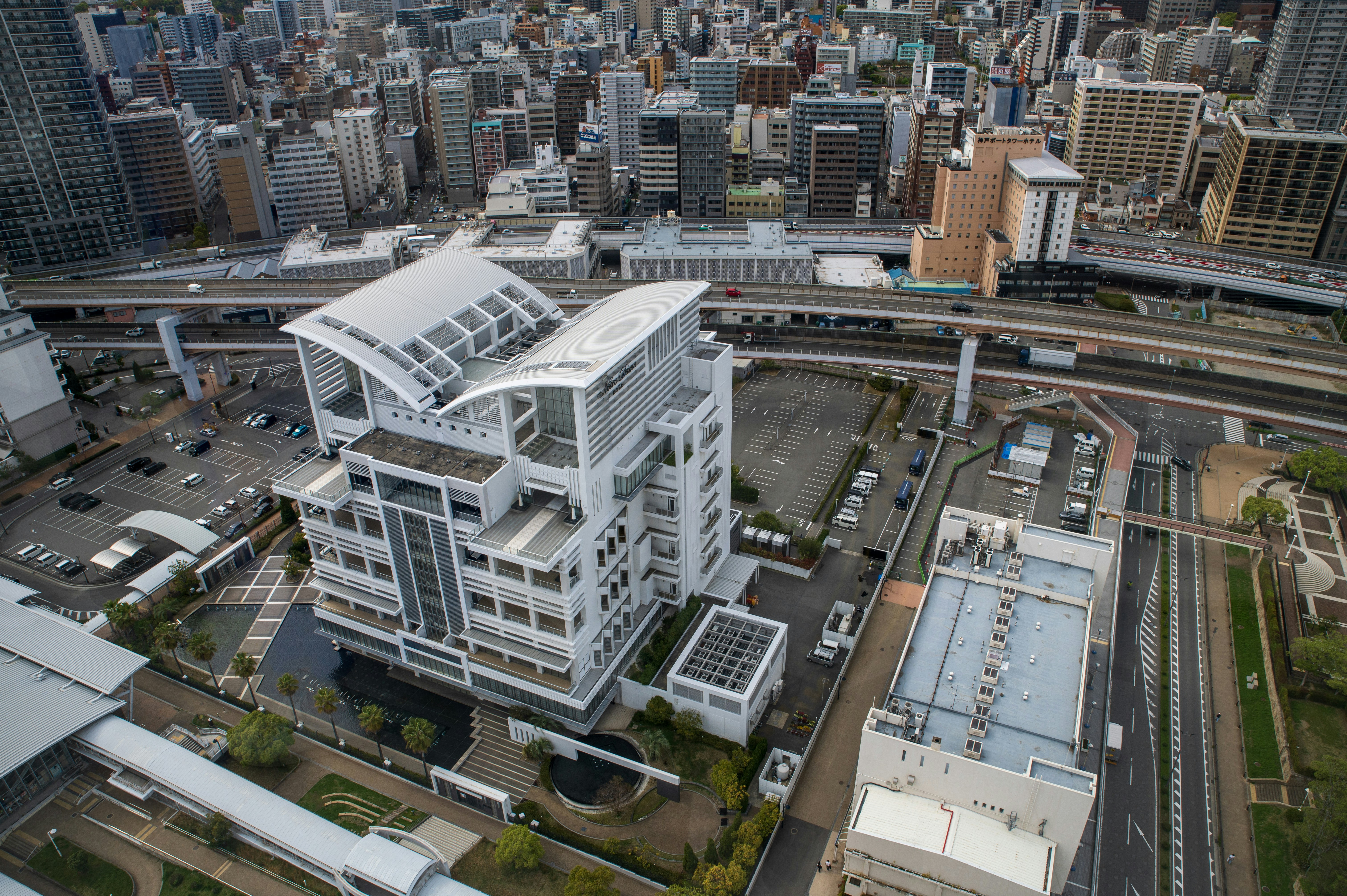 Aerial View of a Modern Urban Complex with Elevated Transit Arteries