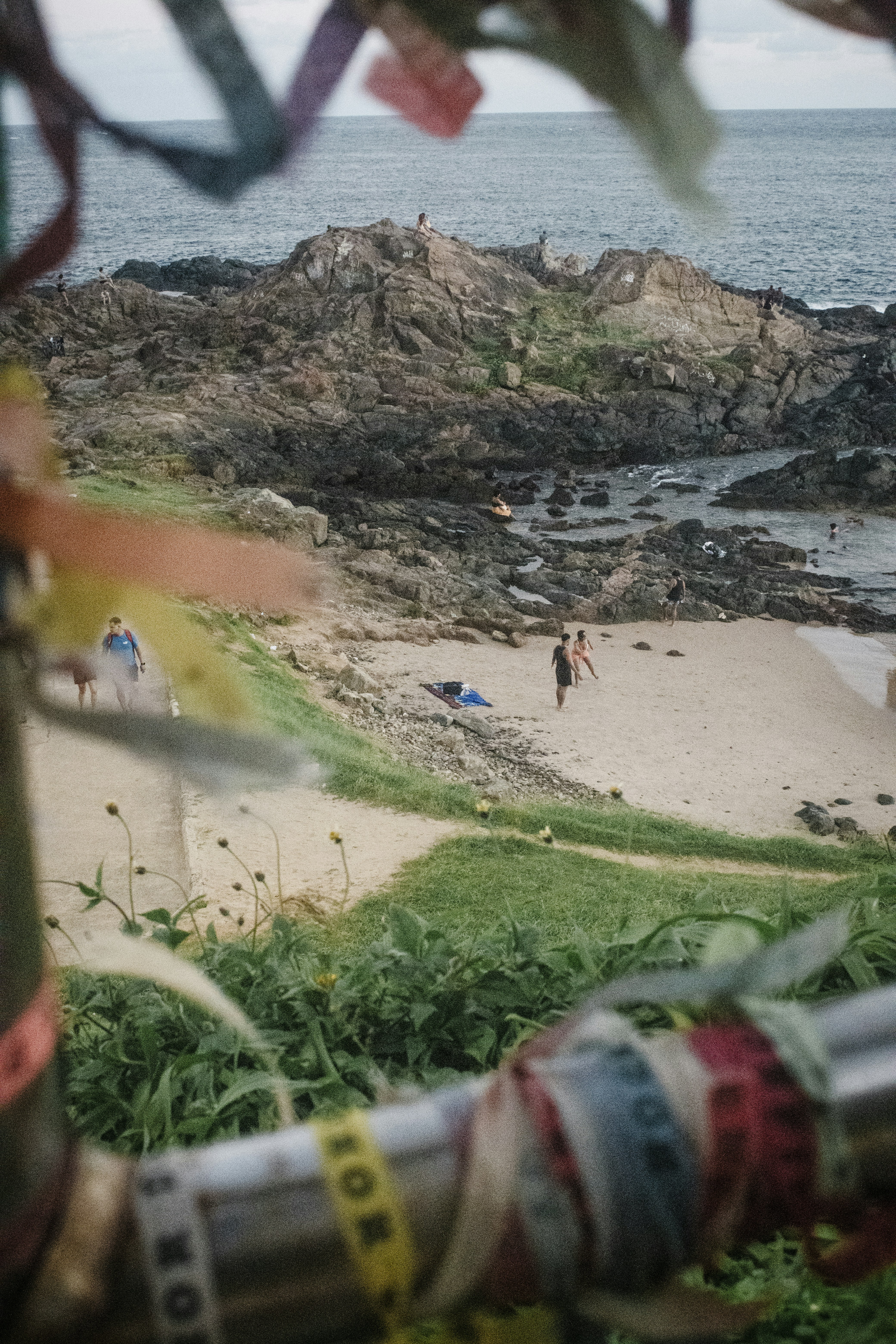 Rugged Cove Through Weights of Colorful Ribbons