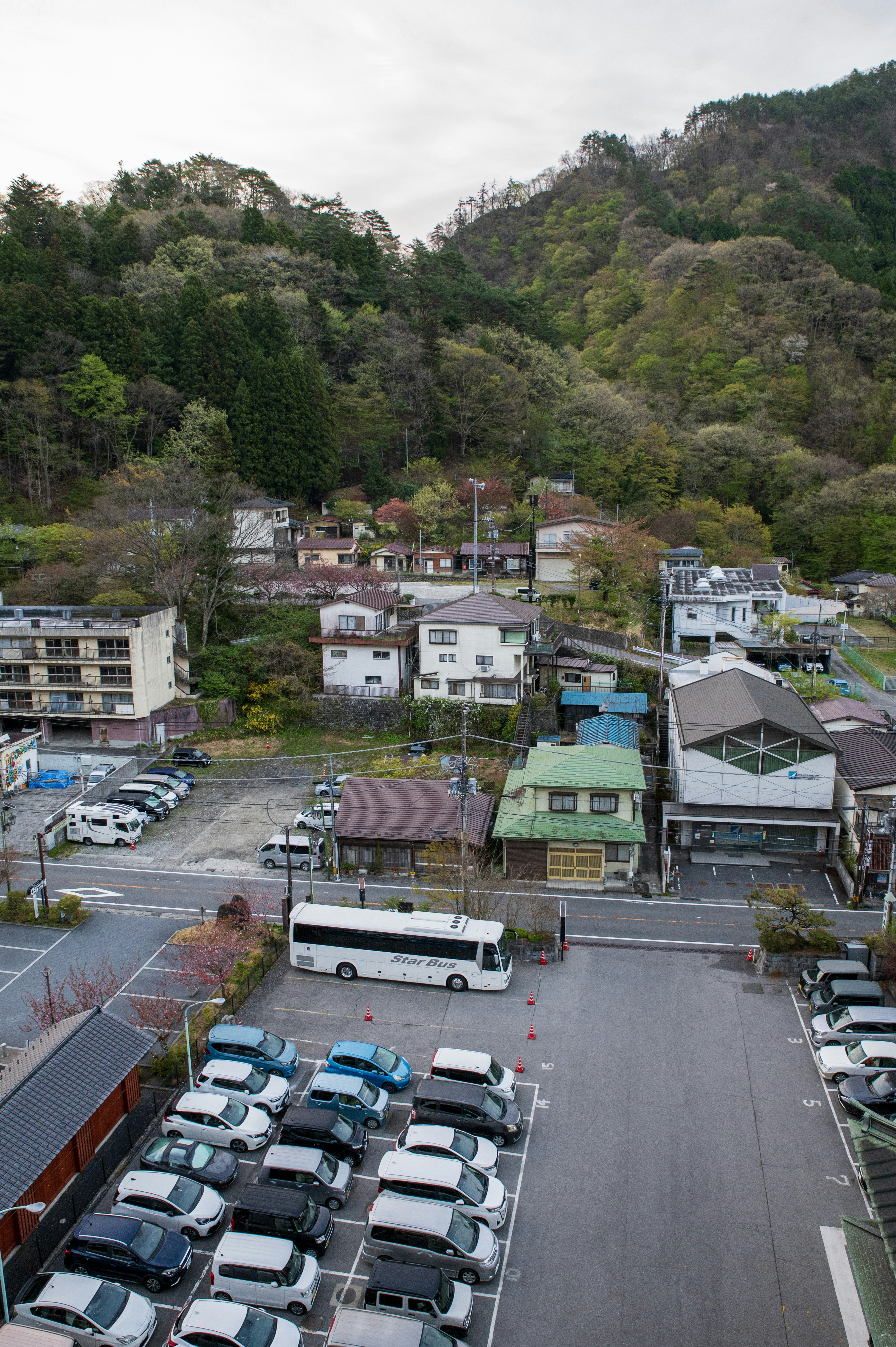 A Quiet Town Framed by Autumn Hills