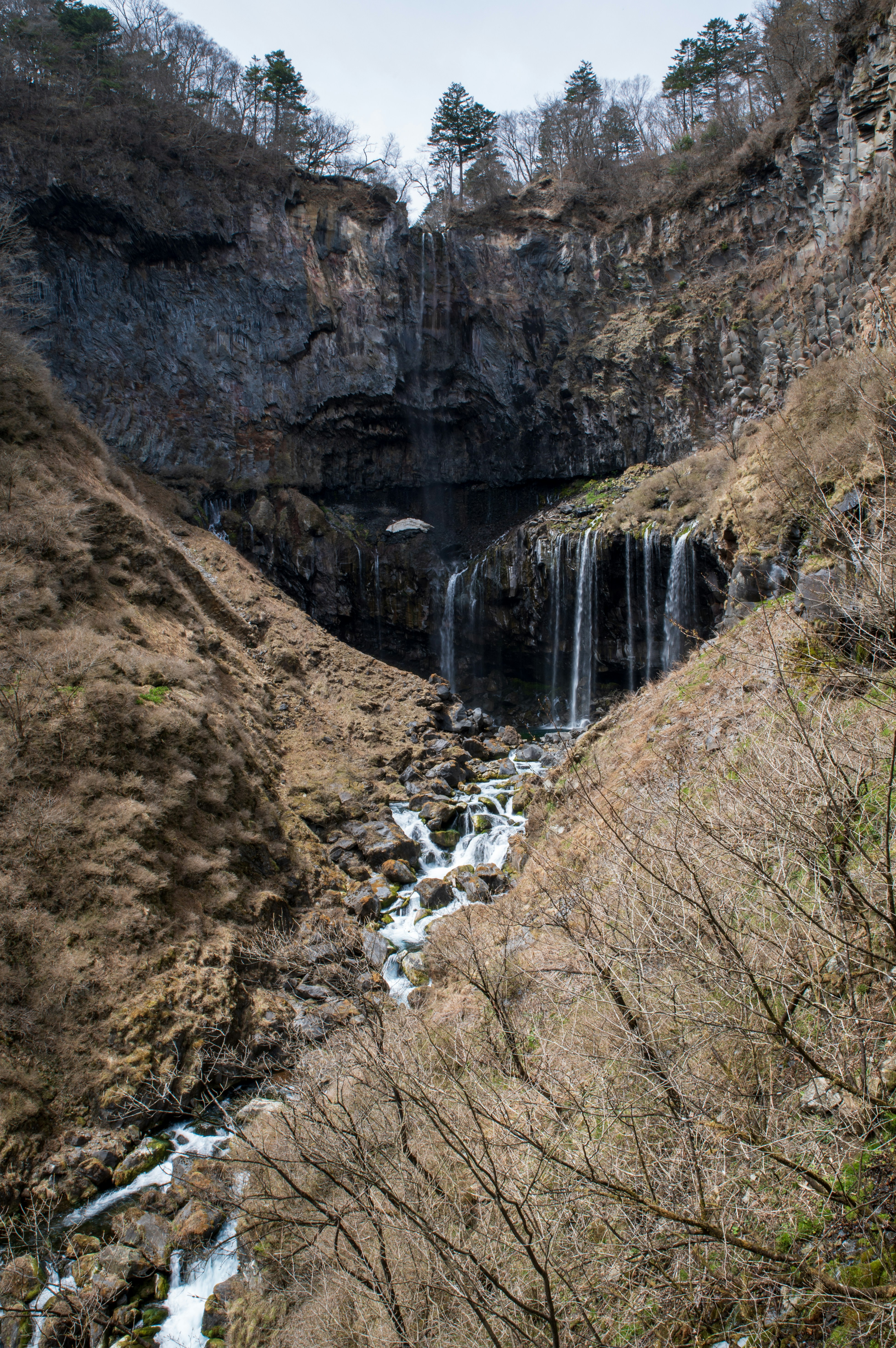 Waterfall Veil Falling Through Cliffside Gorges