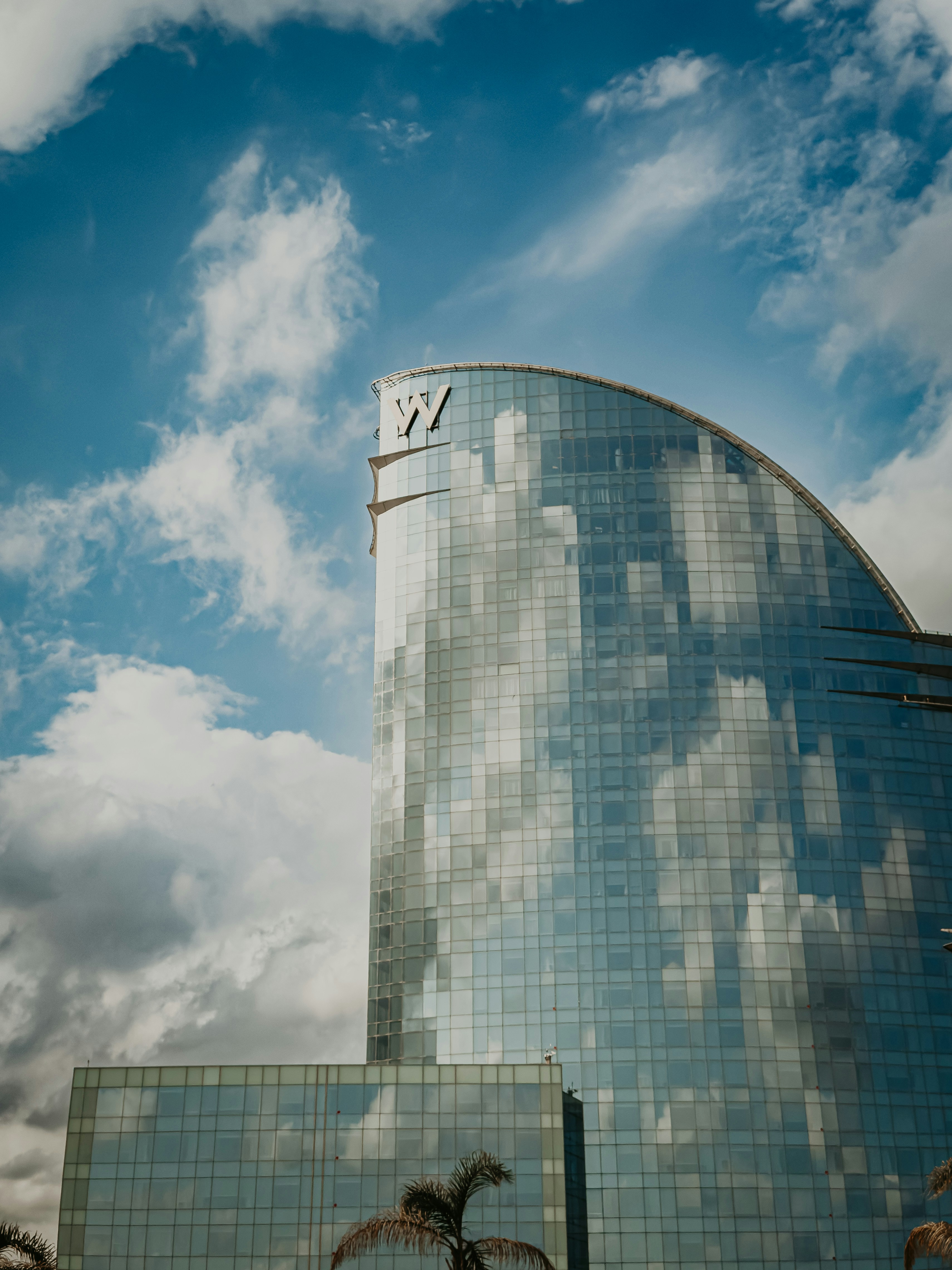 Sky-reflected Glass Sentinel: A Tower Reaching for the Sky