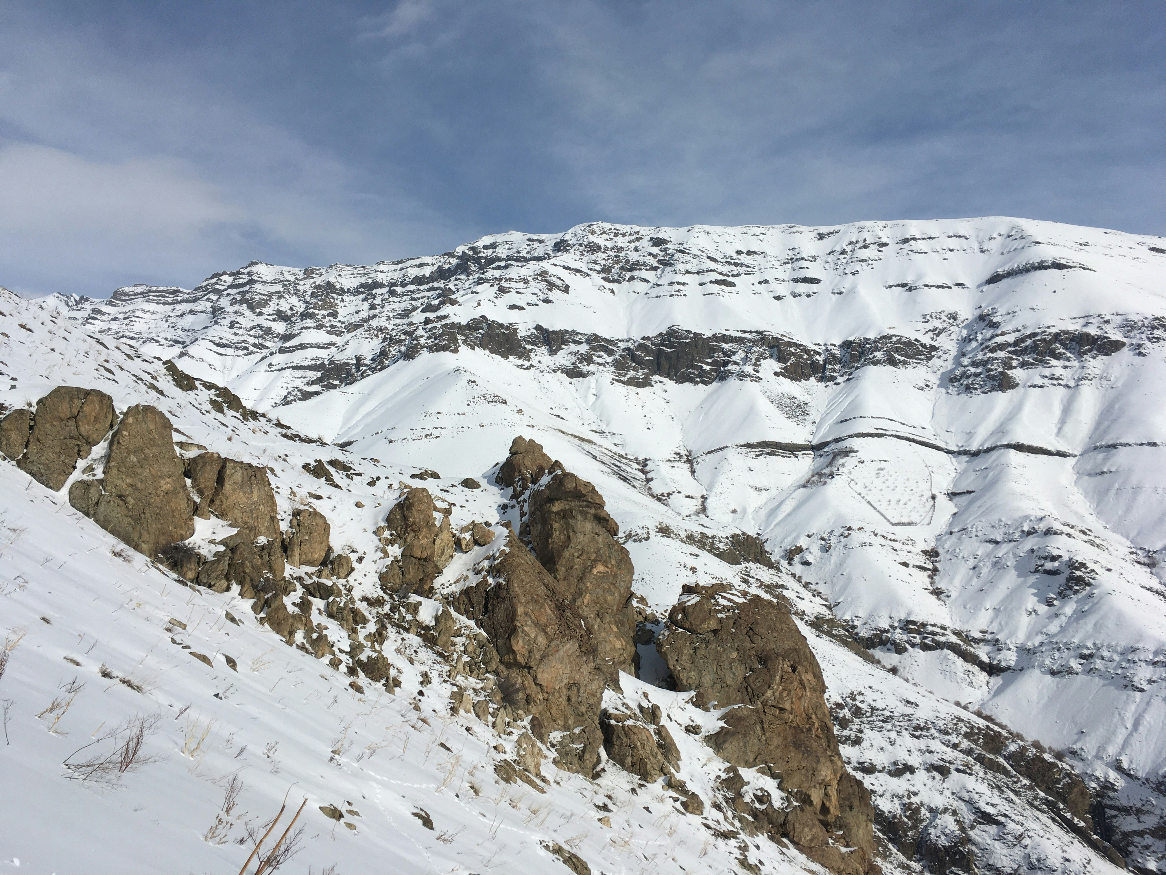 Snow-Sculpted Ridge Under a Clear Sky
