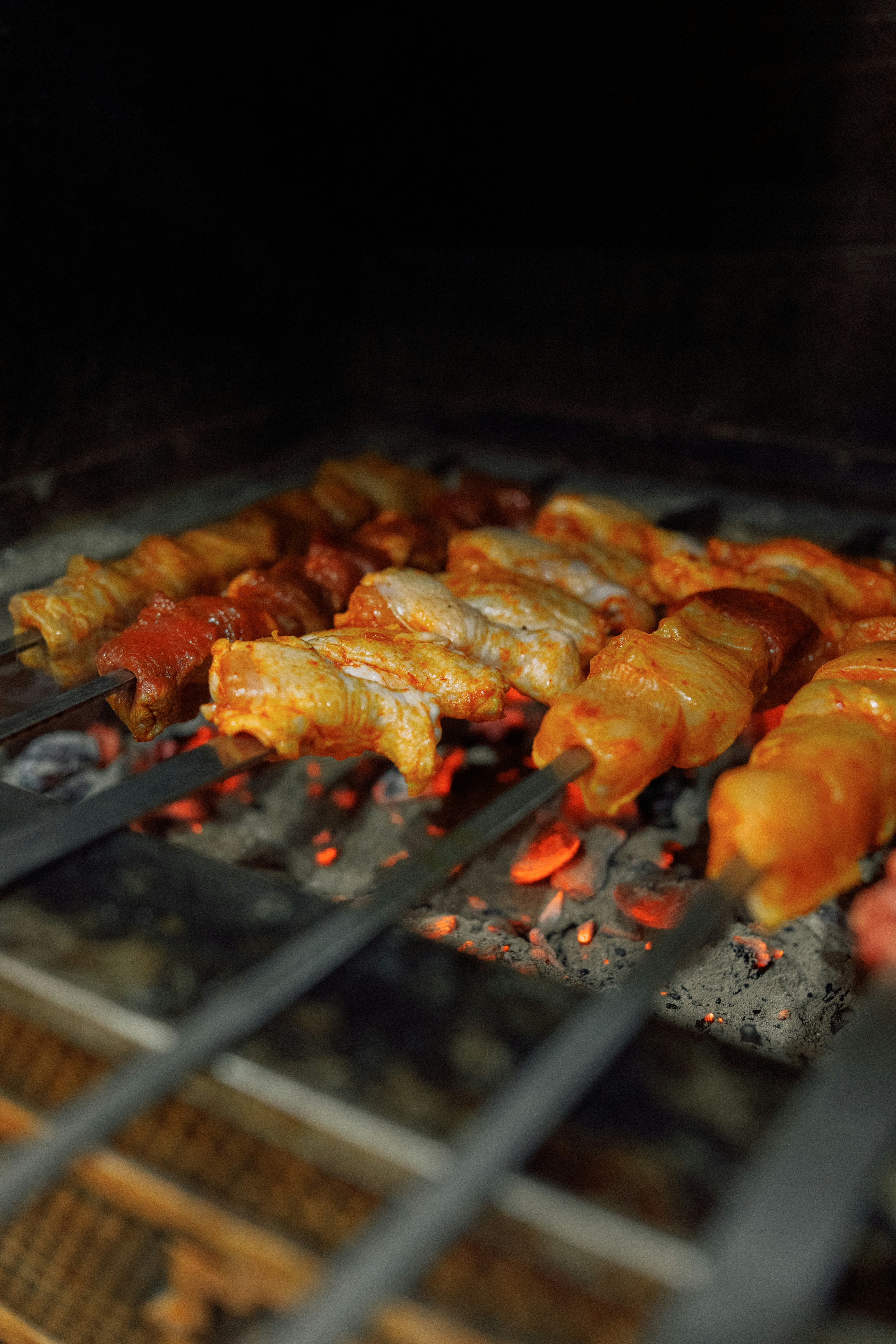 Skewered Sizzle: Charred Chicken Kebabs on White-hot Coals