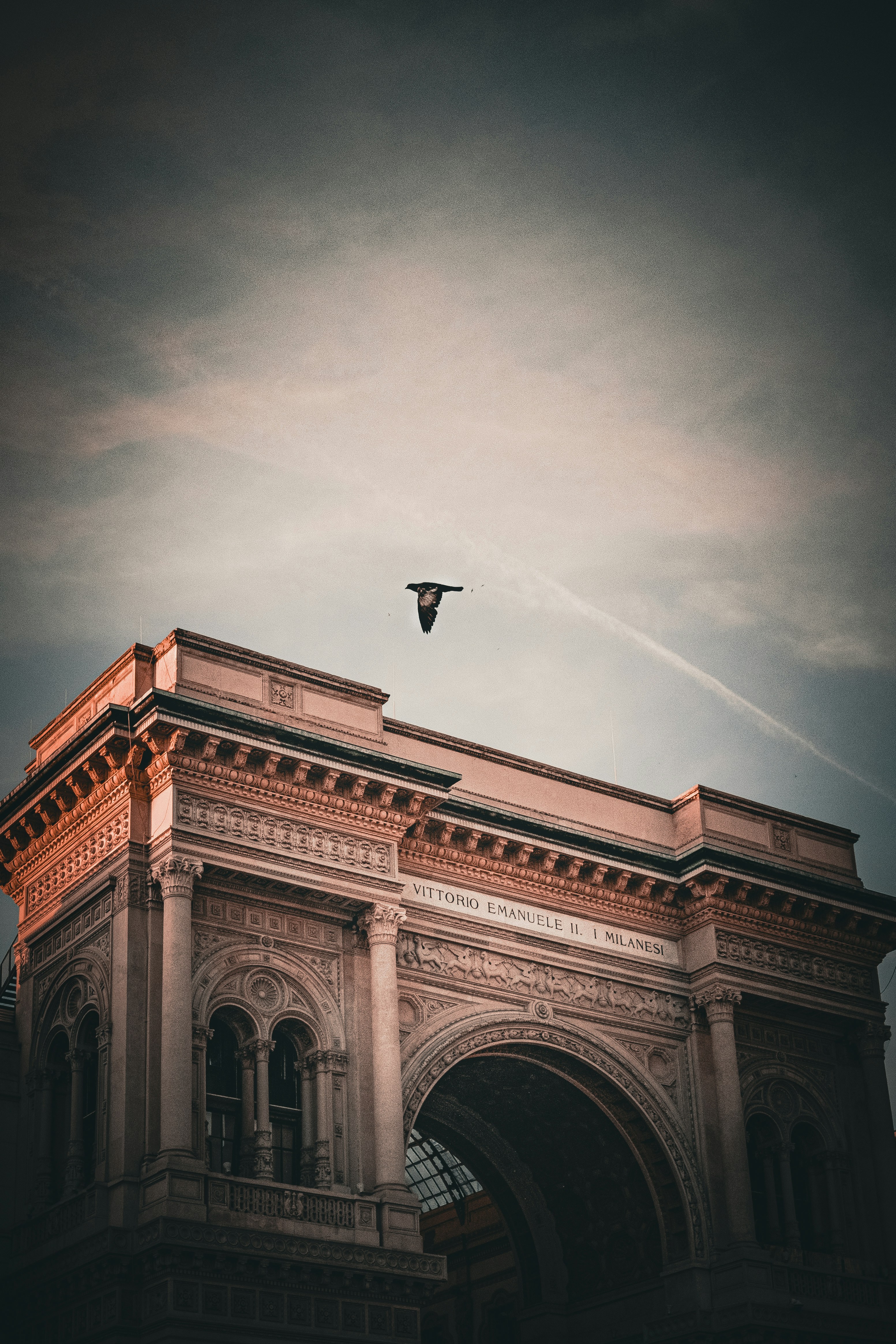 Winged Voyager Above the Arch