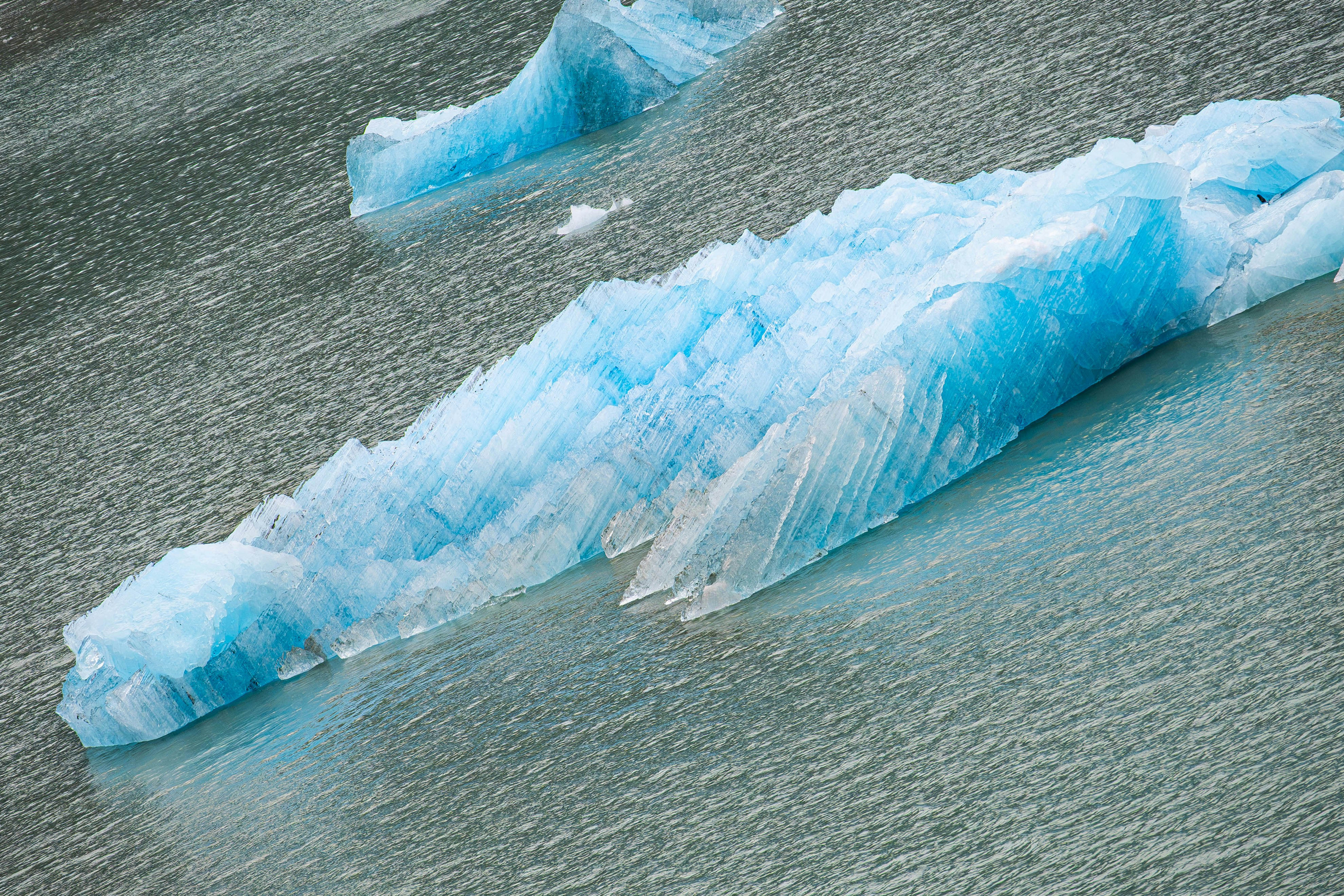 Glacial Blue Rise: Aerial View of Ice Fjord Formations