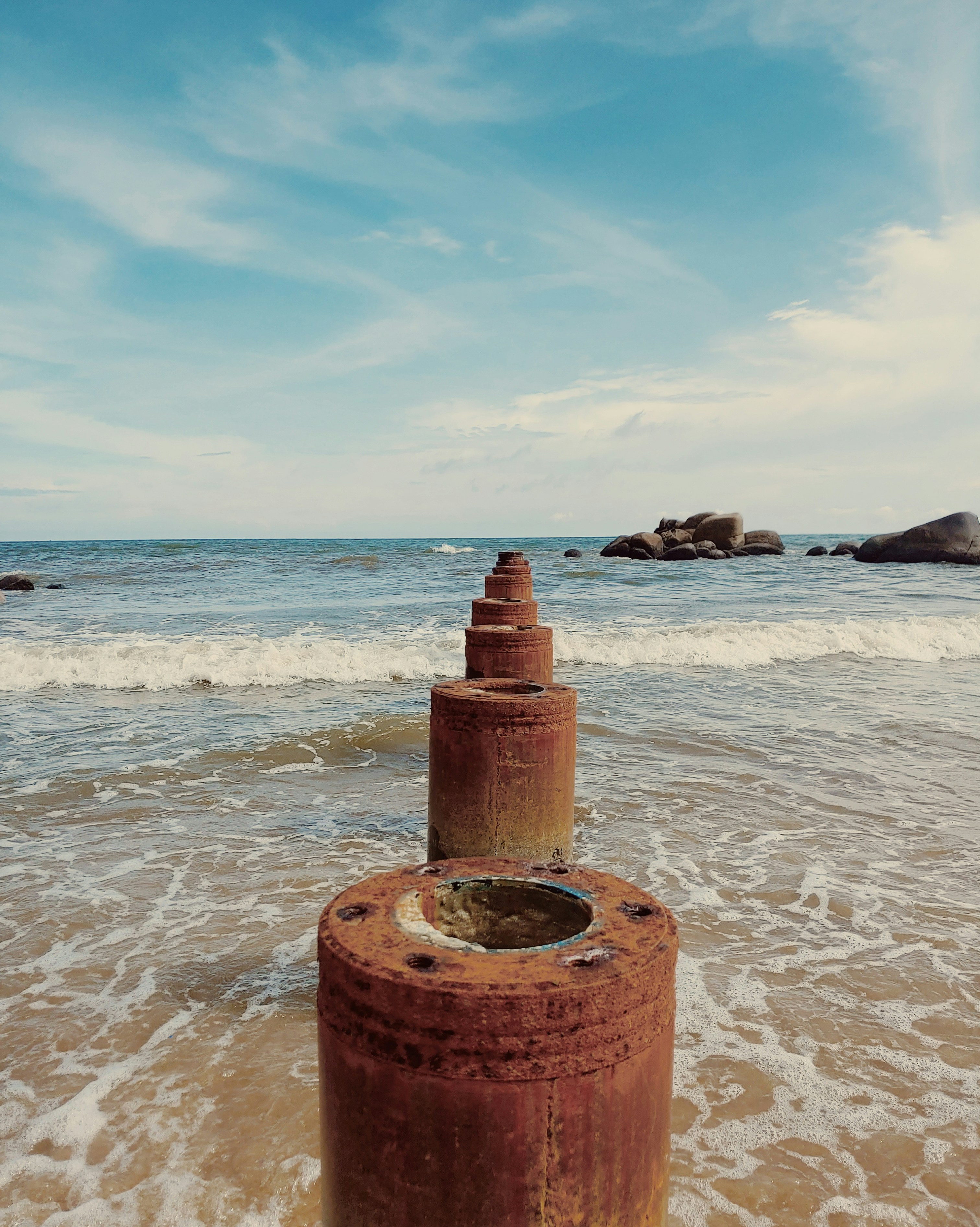 Rusted Barriers Meet the Sea: a Waiting Line of Sea Castings