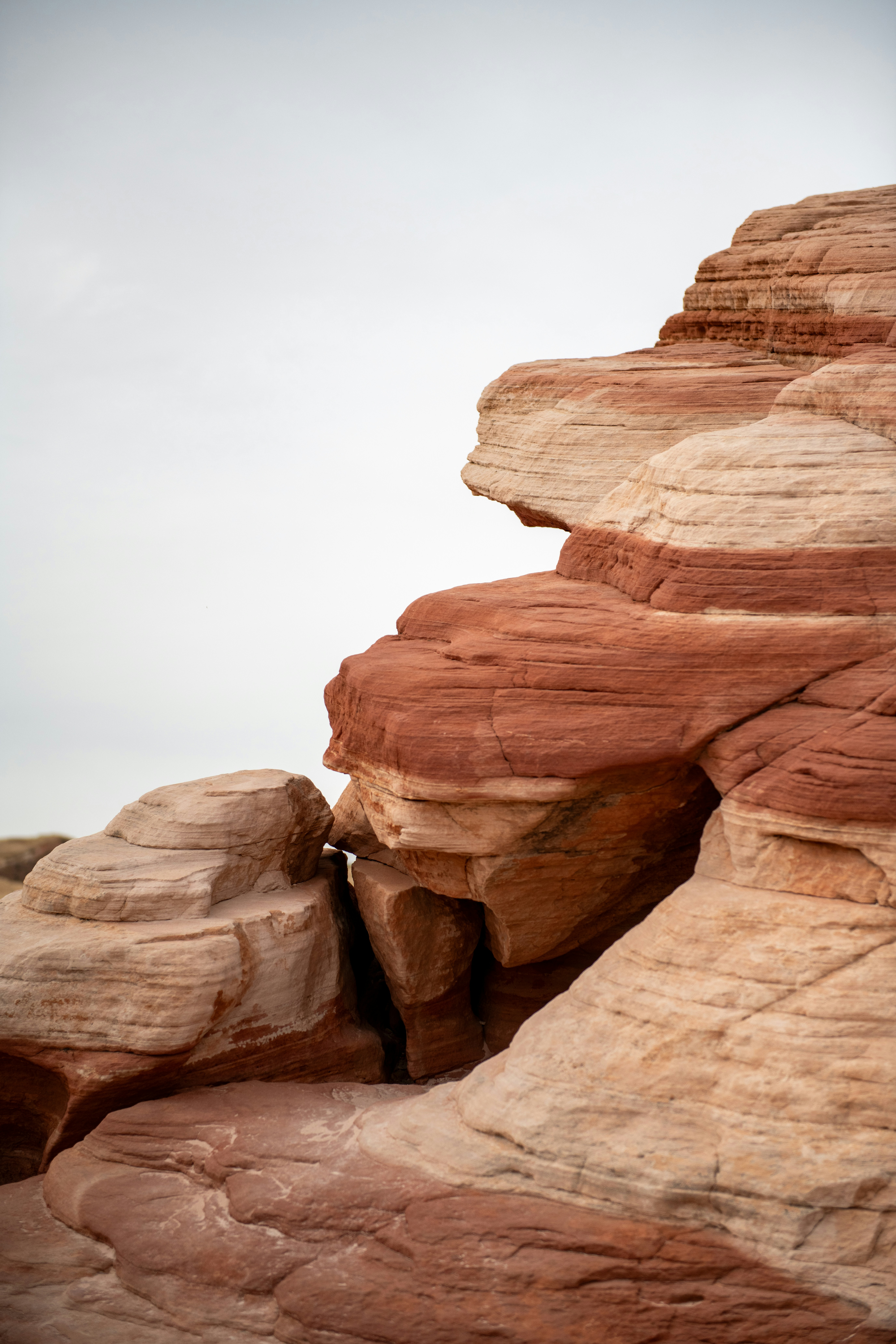 Stratified Red Cliffs Carved by Time