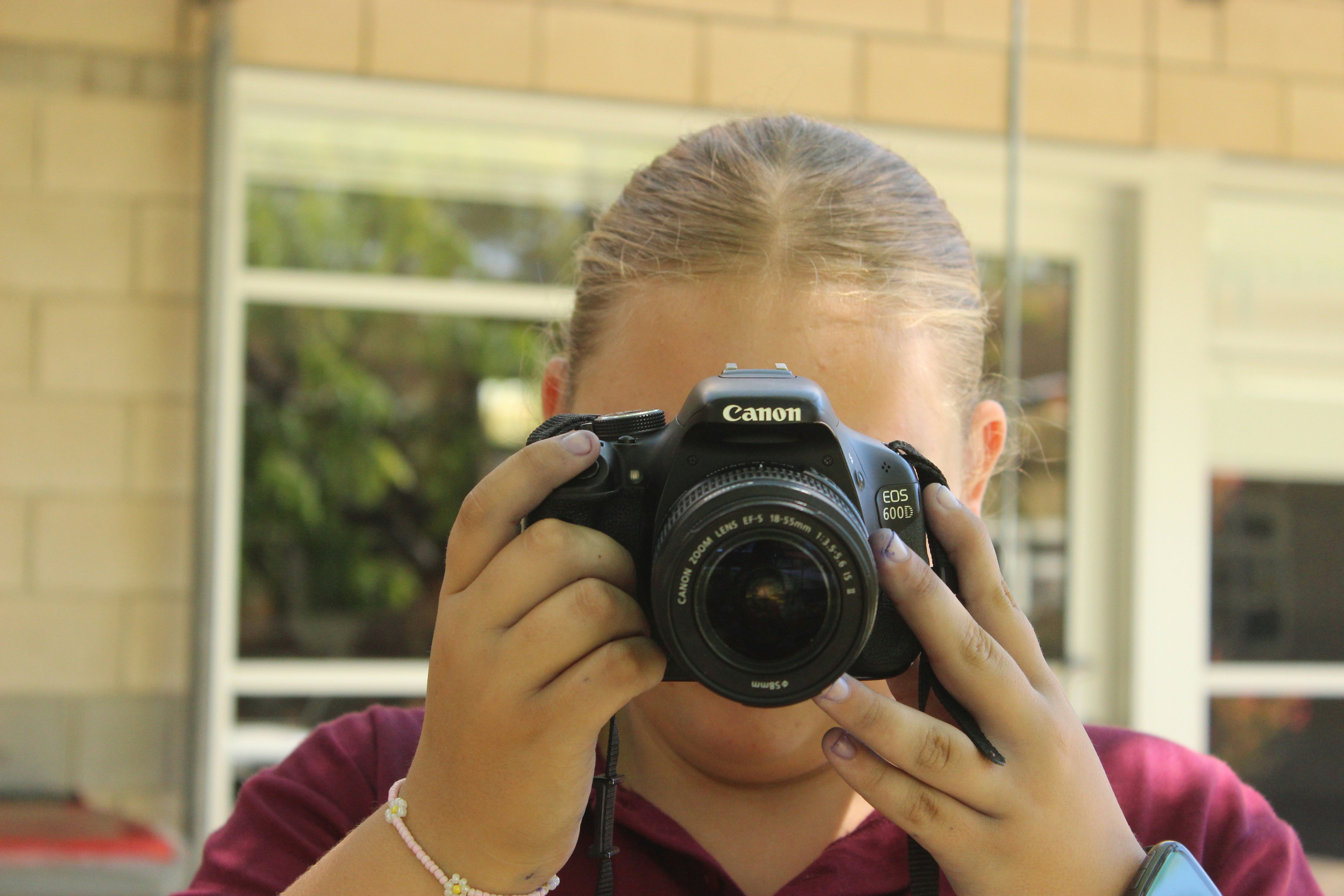 Inward Focus: A young photographer with a Canon on the lens