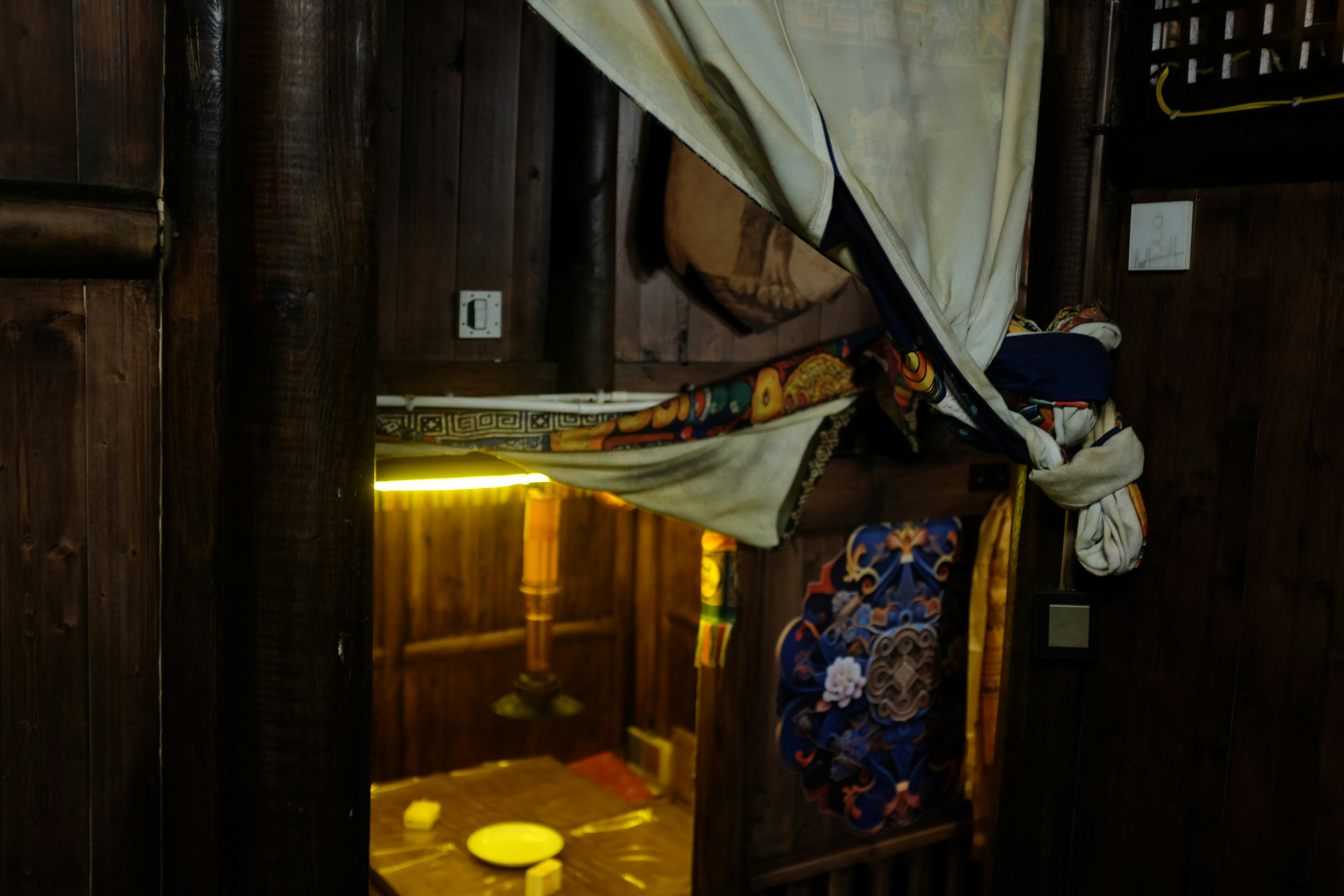 Lantern-lit Shrine Nook Hidden Behind Curtain