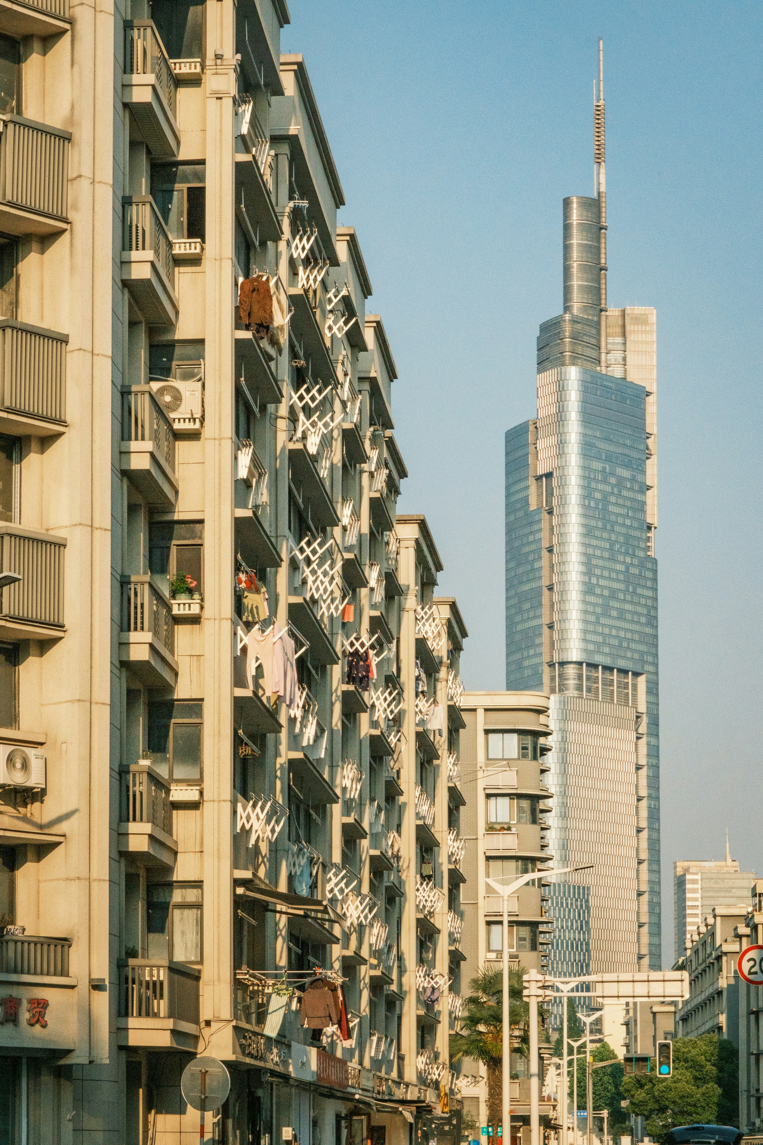 Neon Towers and Leaning Streets: A Portrait of Urban Ascent