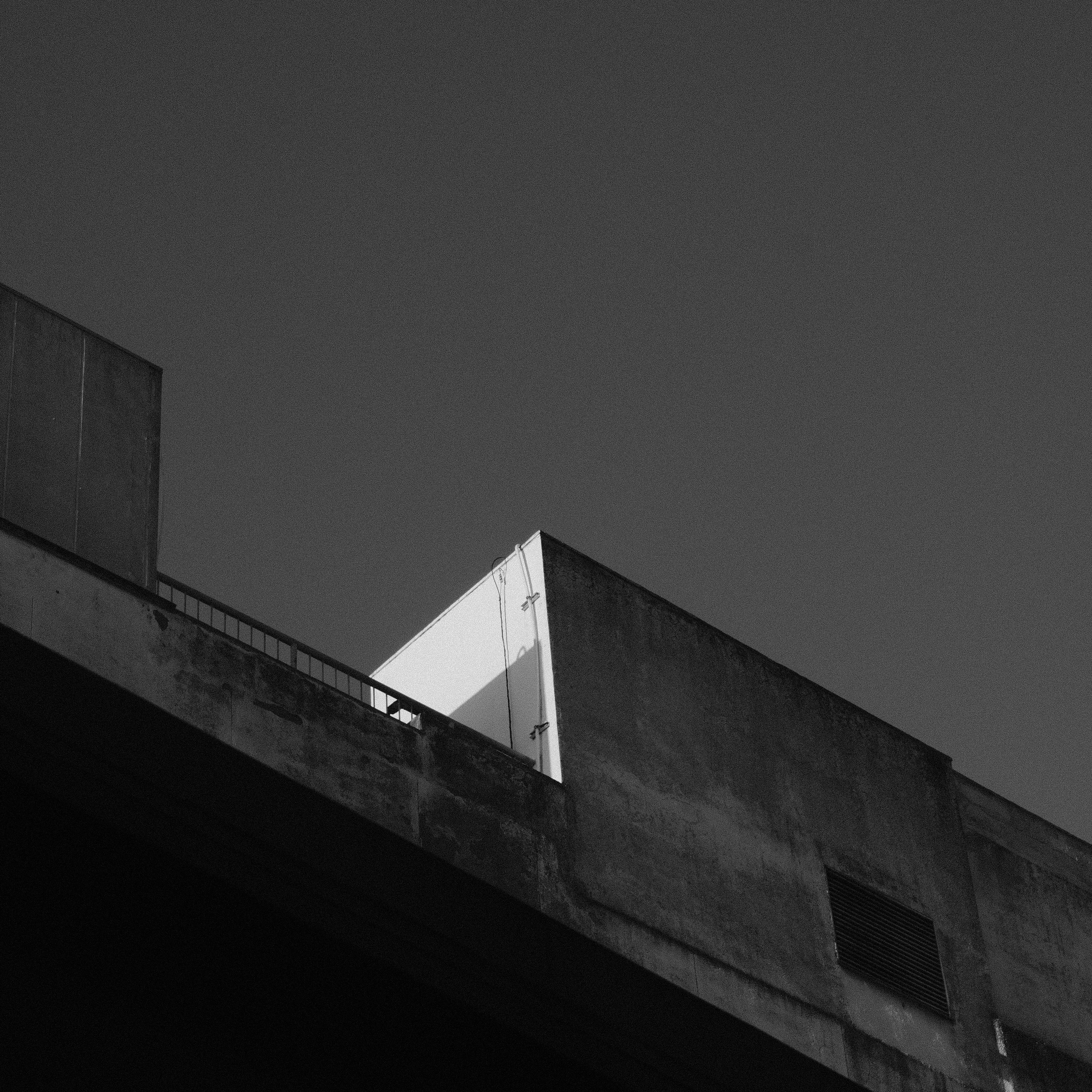 Concrete Pyramid at Dusk: A Quiet Cut of Geometry on a Rooftop