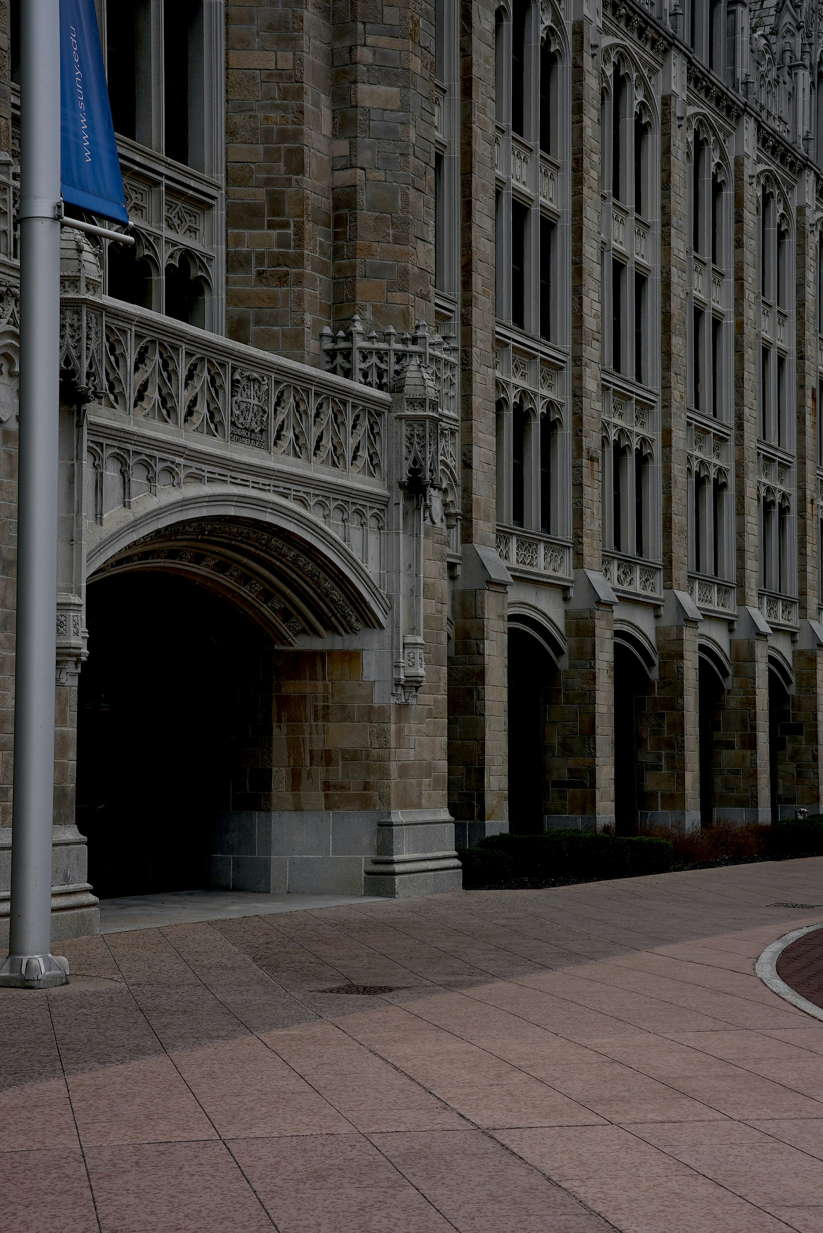 Gothic Facade and Arched Entrance of a Domed Courtyard Building