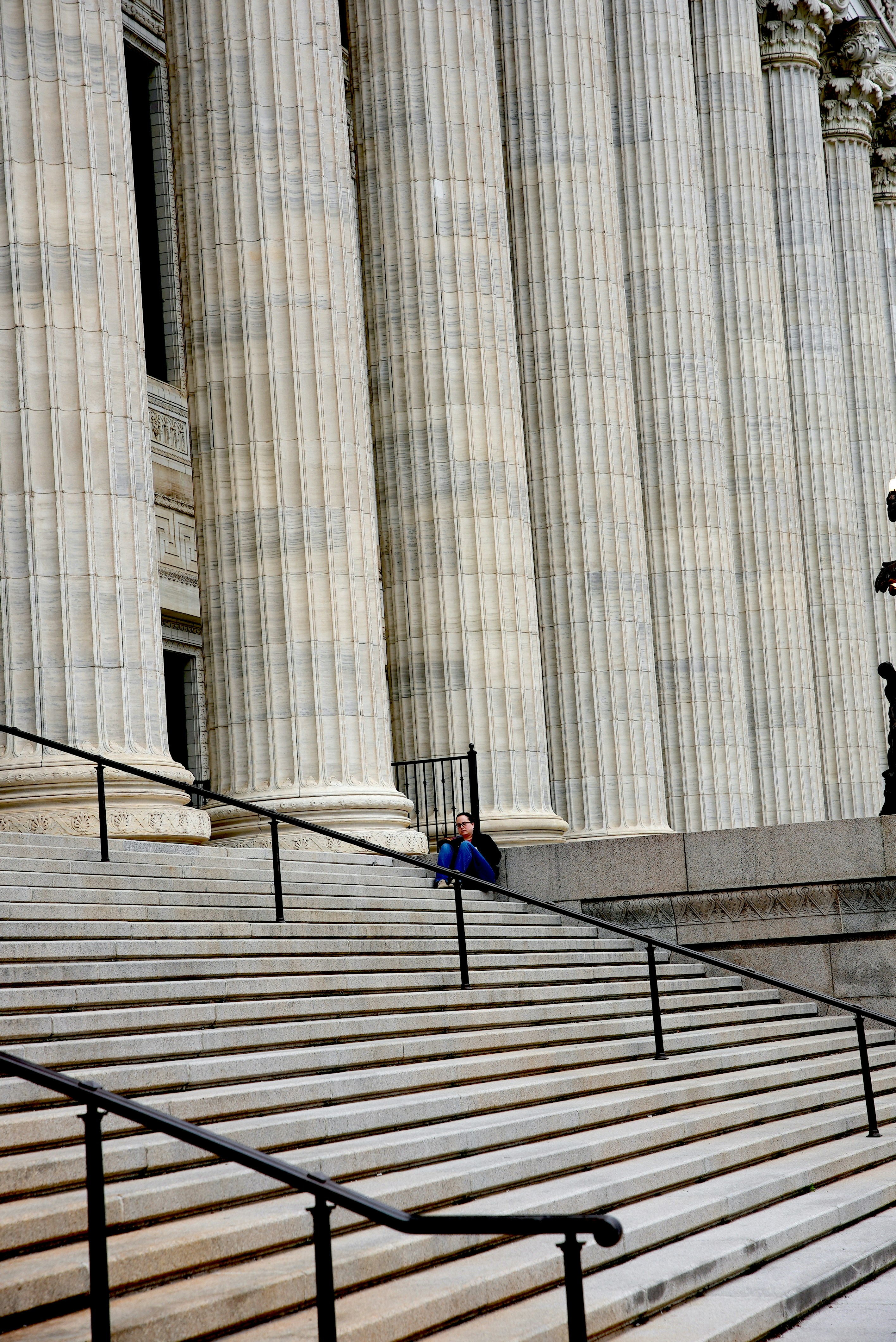 Staircase Under Columns: A Quiet Moment at the Monumental Steps