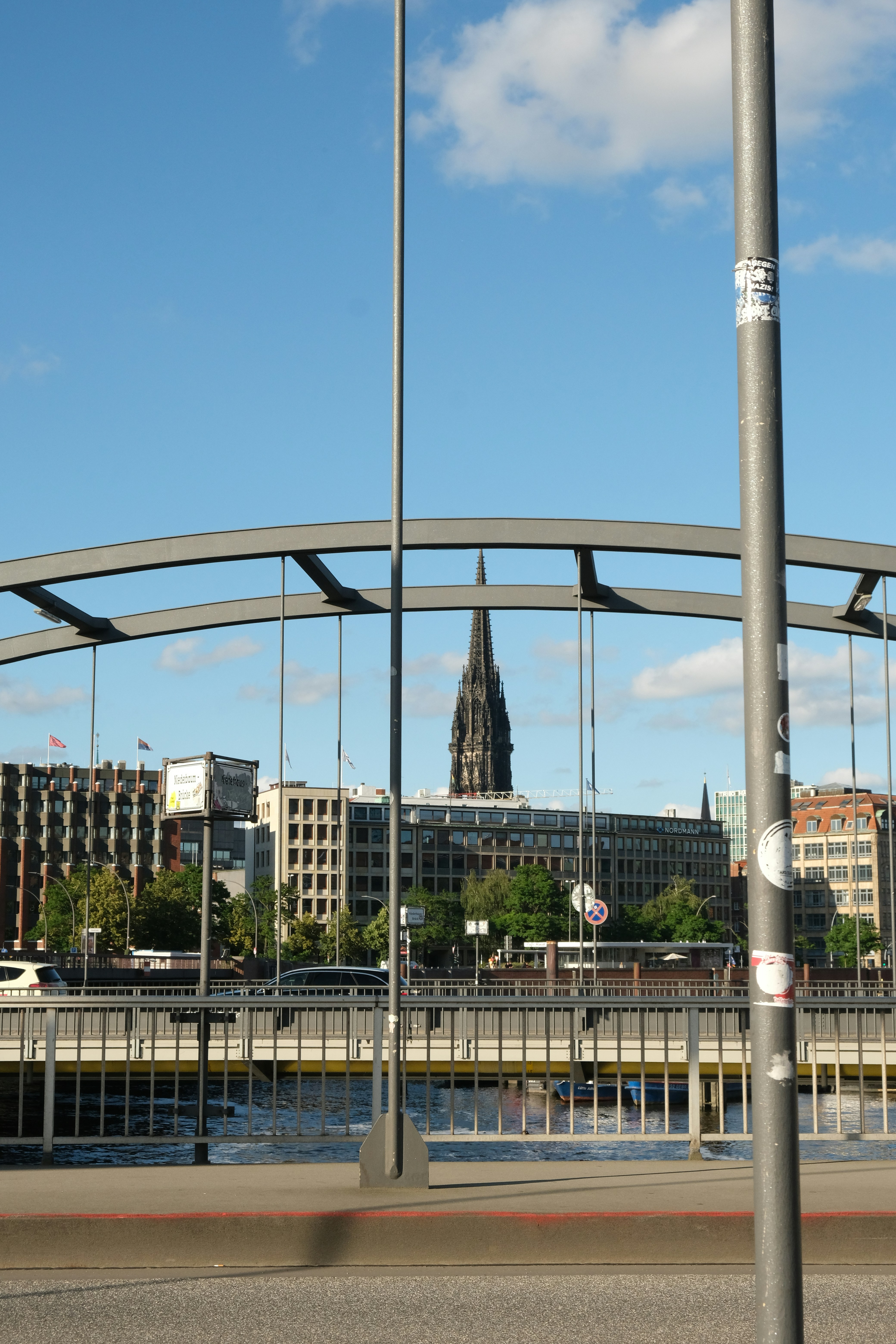 Stalwart Riverfront Spine with Gothic Spire Rising Beyond
