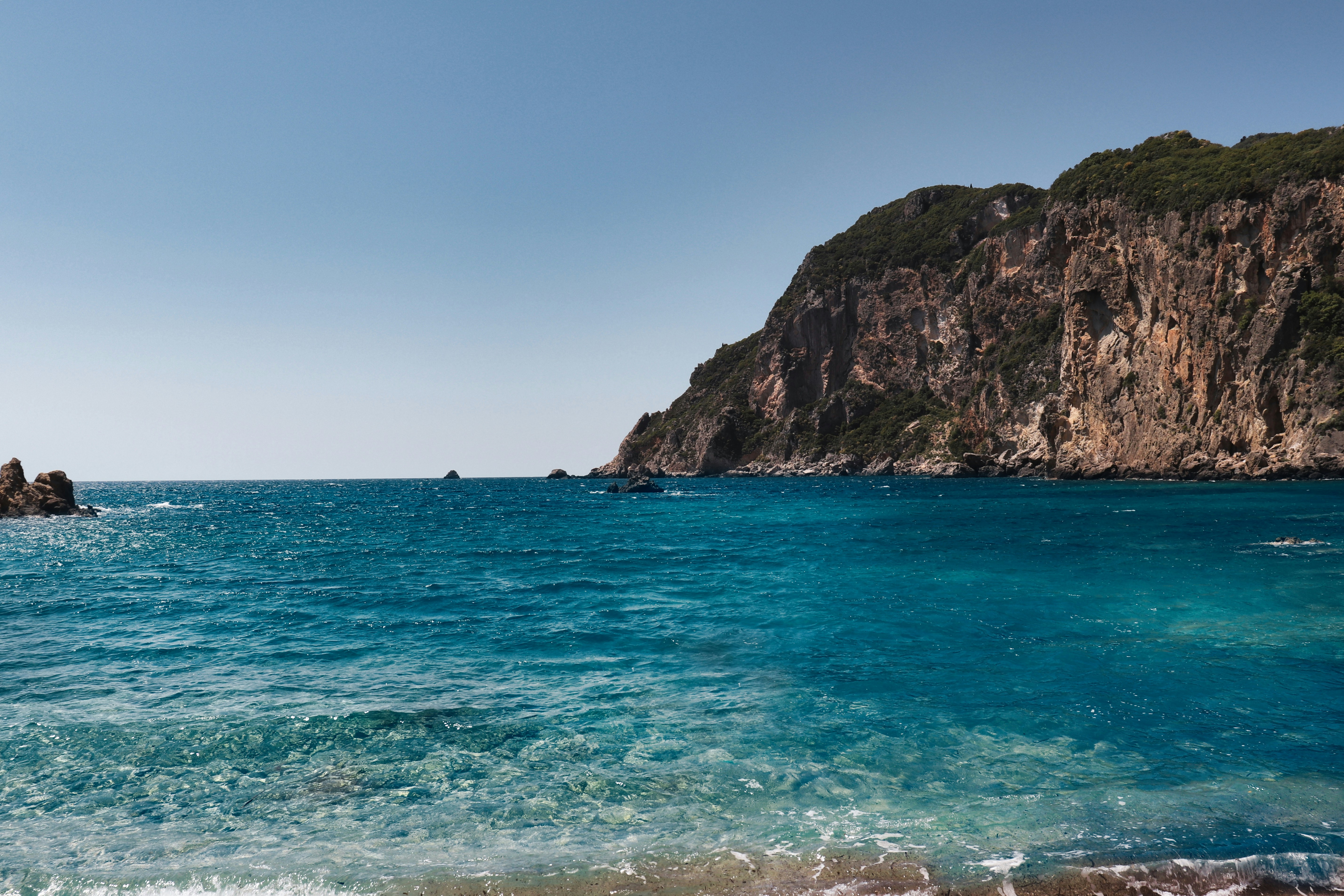 Azure Coastline: A Quiet Confluence of Sea and Cliff