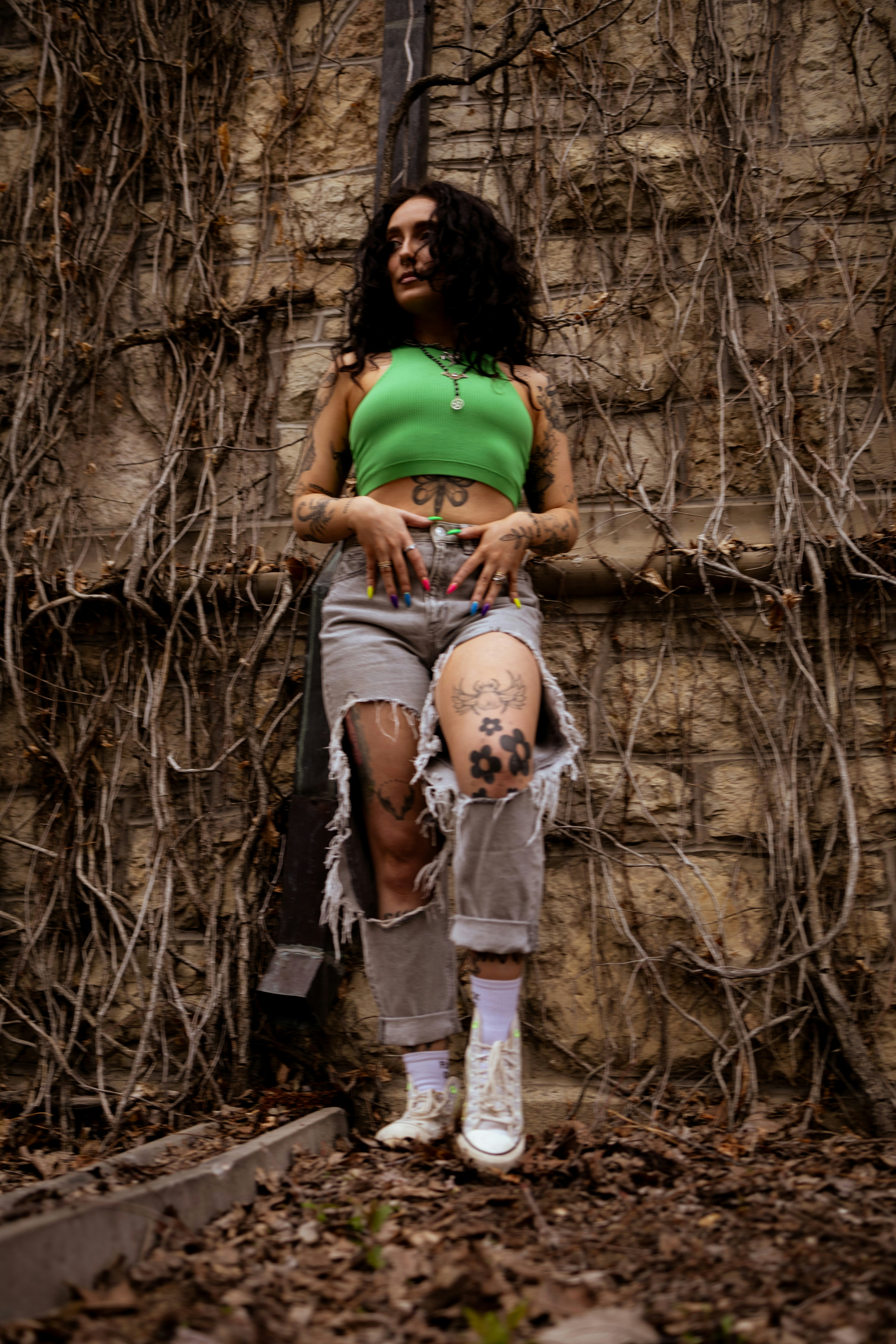Green Crop Top, Urban Ivy: A Bold Portrait Among Brambles