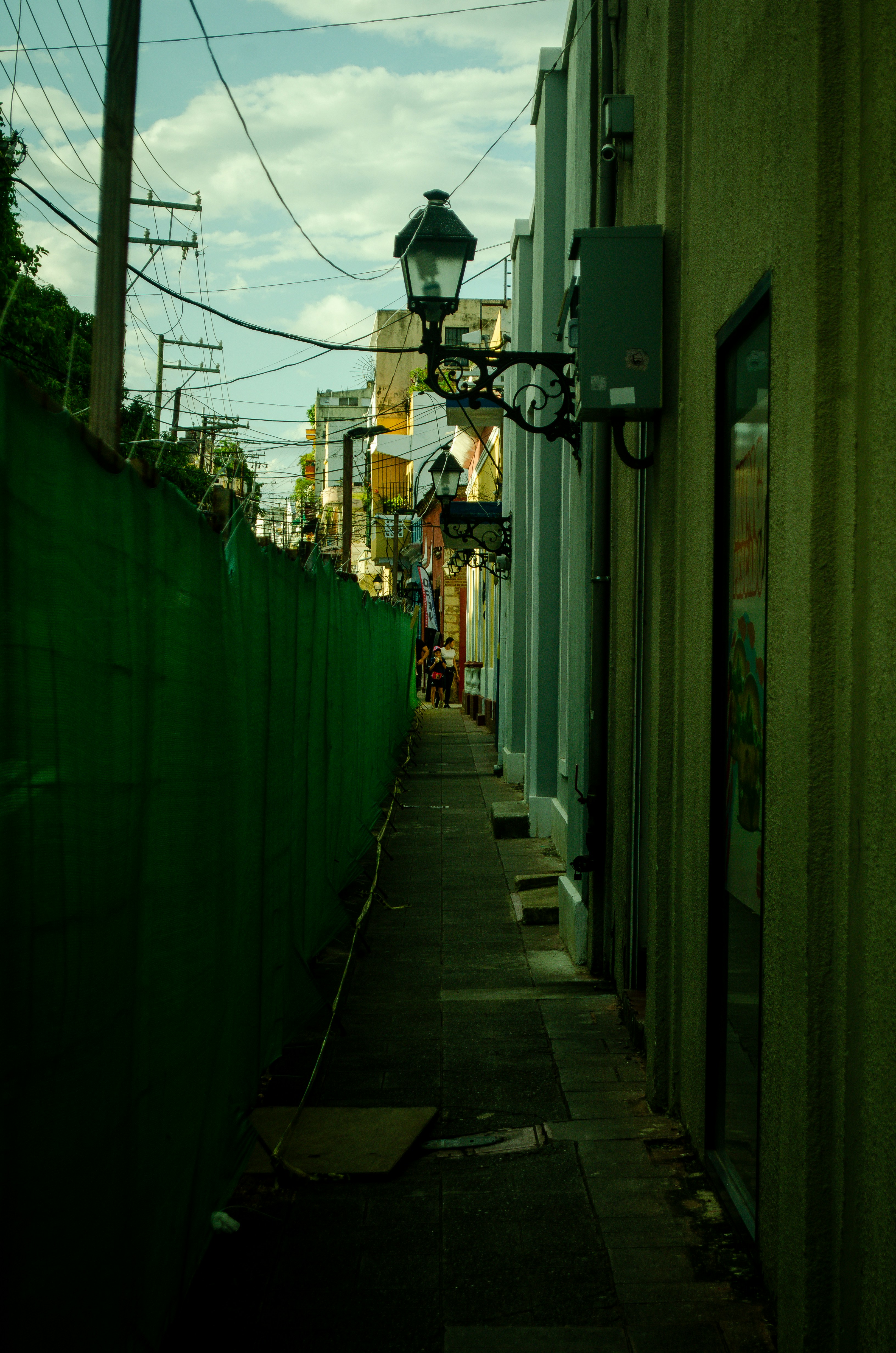 Laneway Lanterns: A Narrow Path Under Electric Skies