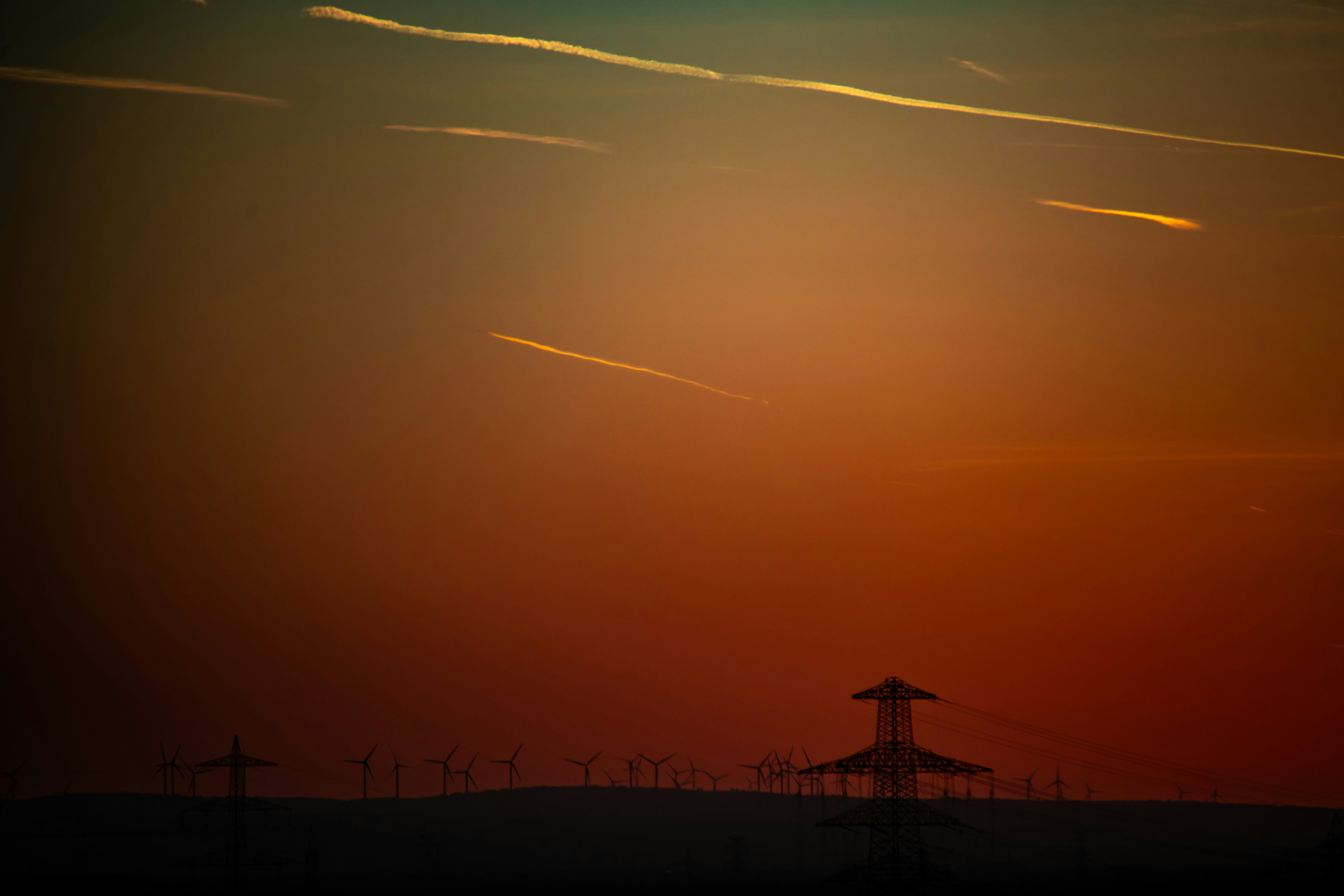 Last Light Over the Grid: Dusk Beneath Transmission Towers