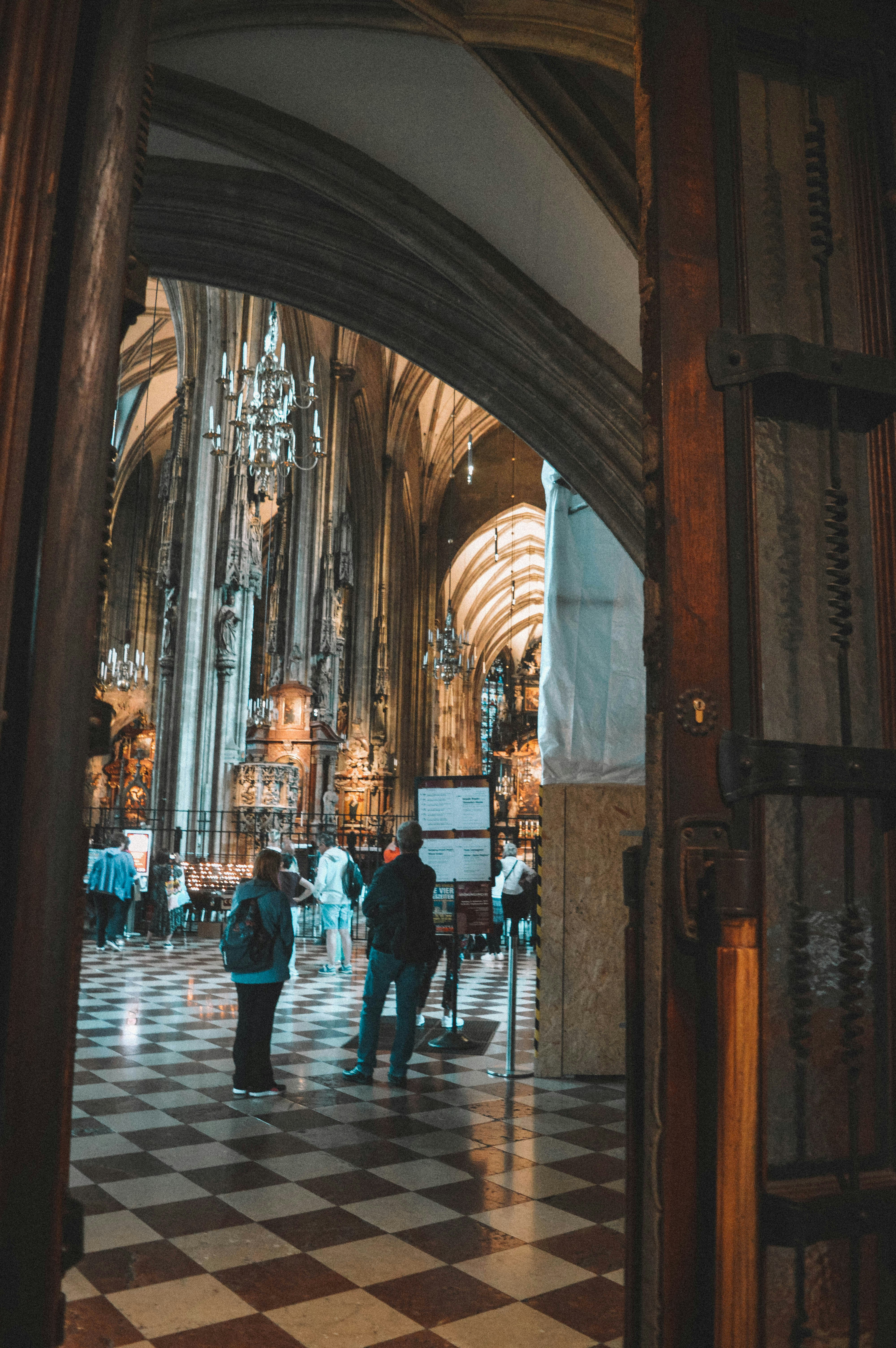Cathedral Floor of Stillness: Wanderers Beneath the Arches