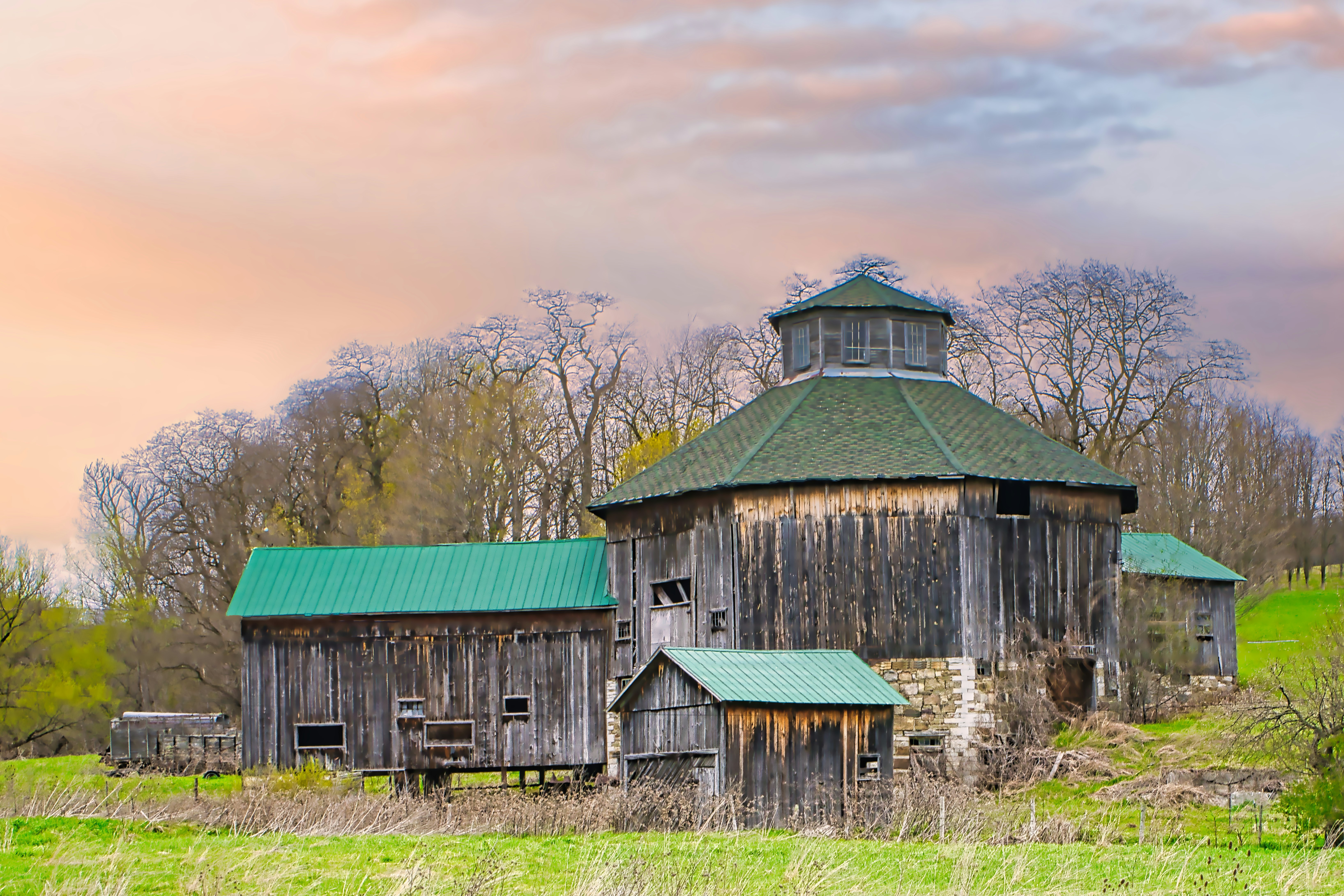 Weathered Barndom: An Aged Granary Reaching Toward a Sunset