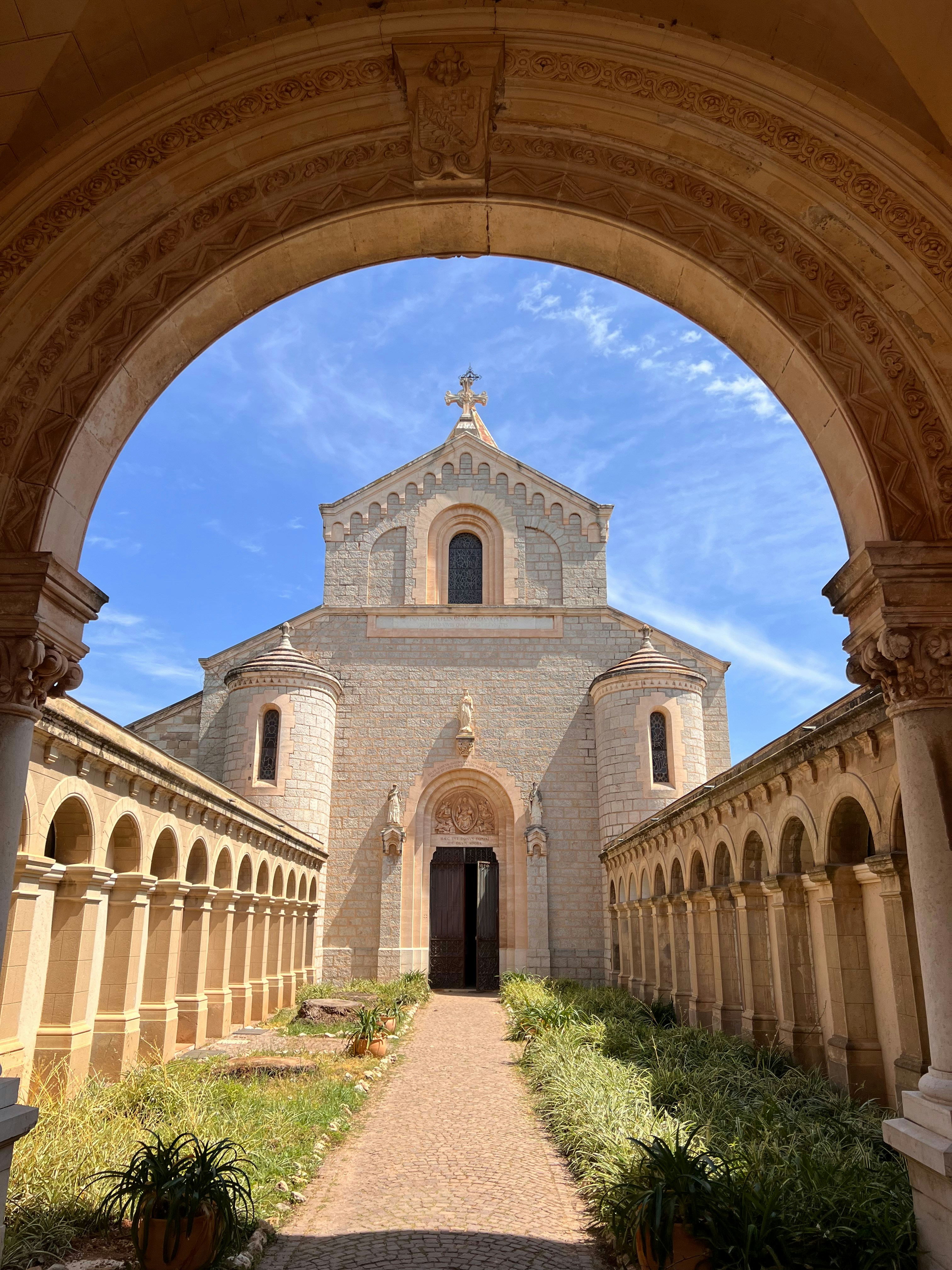 Archway to the Chapel: Central Pathway to a Historic Facade
