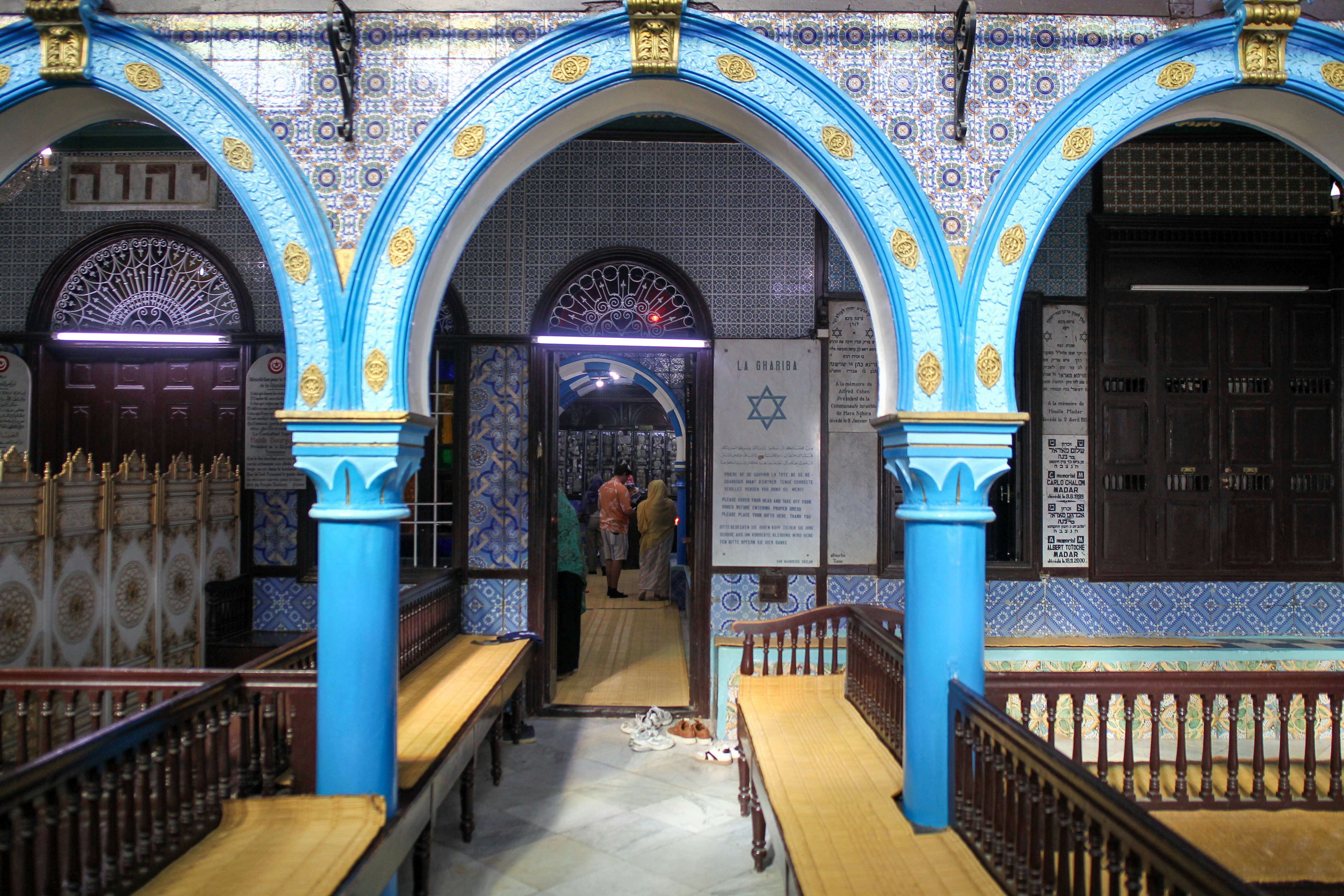 Blue Archways of Memory: A Temple Courtyard Snapshot