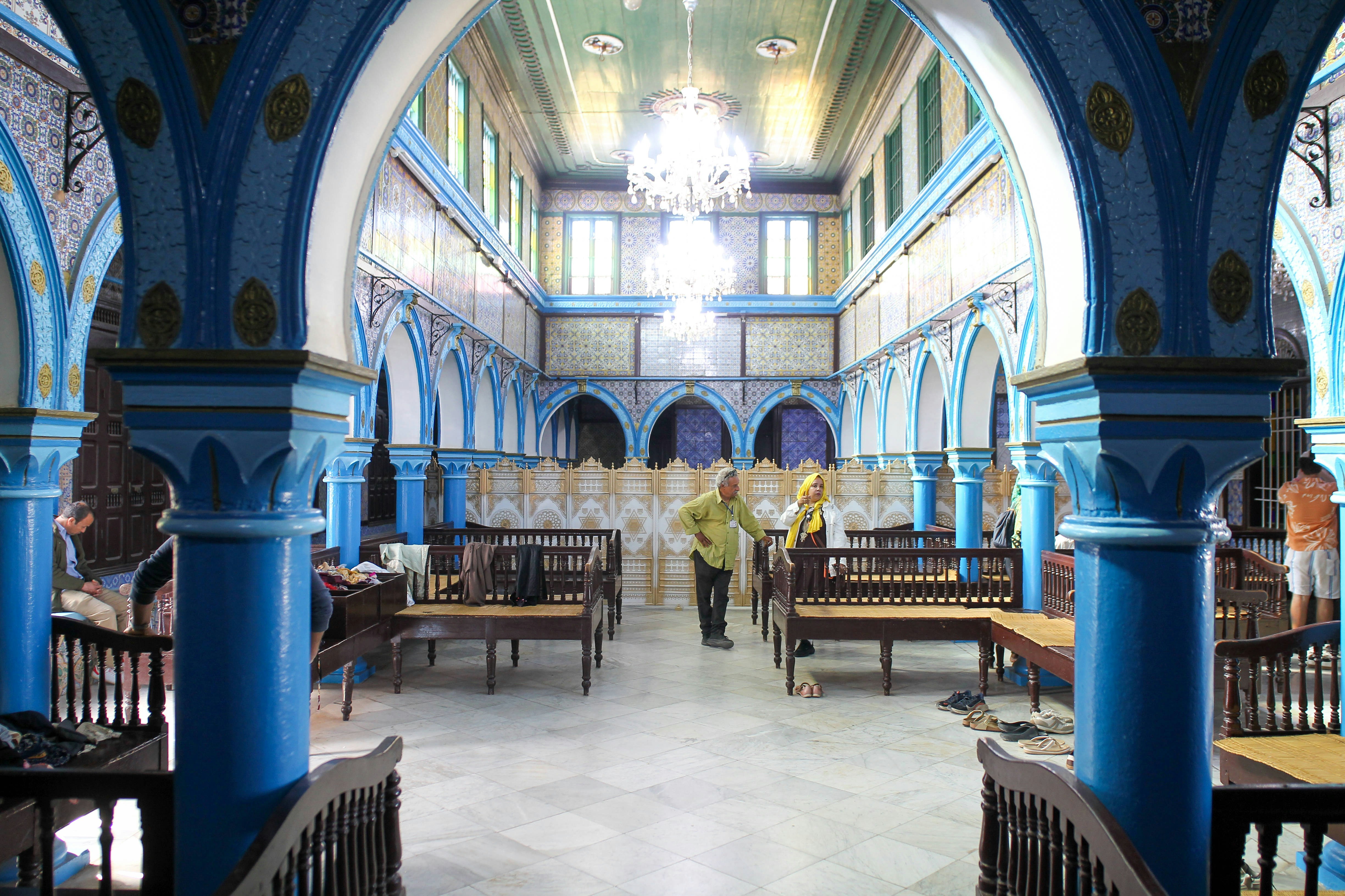 A Jewish pilgrim prays inside the historic Ghriba synagogue in the Tunisian resort island of Djerba, during the annual Jewish pilgrimage on April 30, 2026.