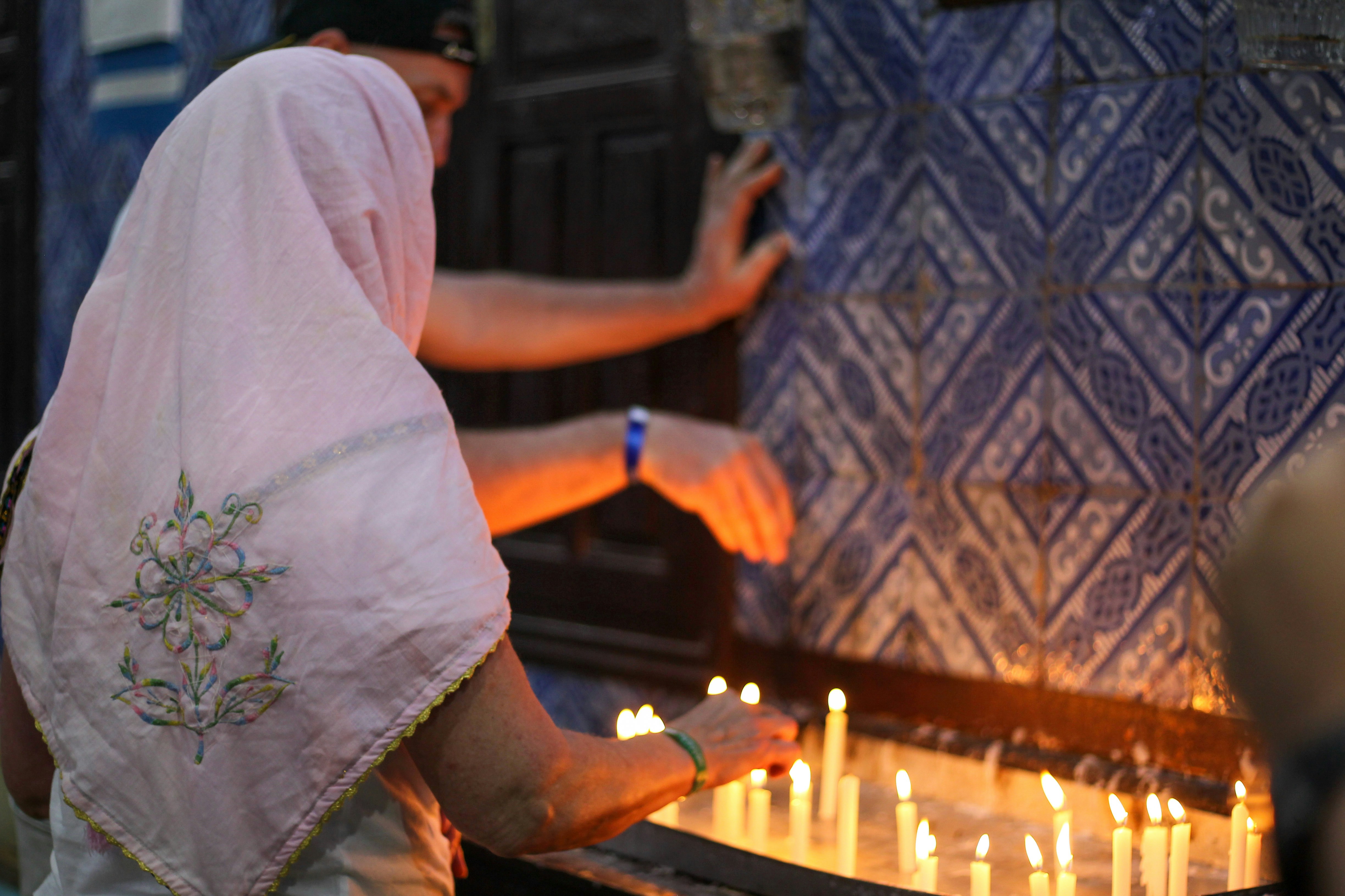 Candles and Quiet Hands: Ritual Light at the Shrine