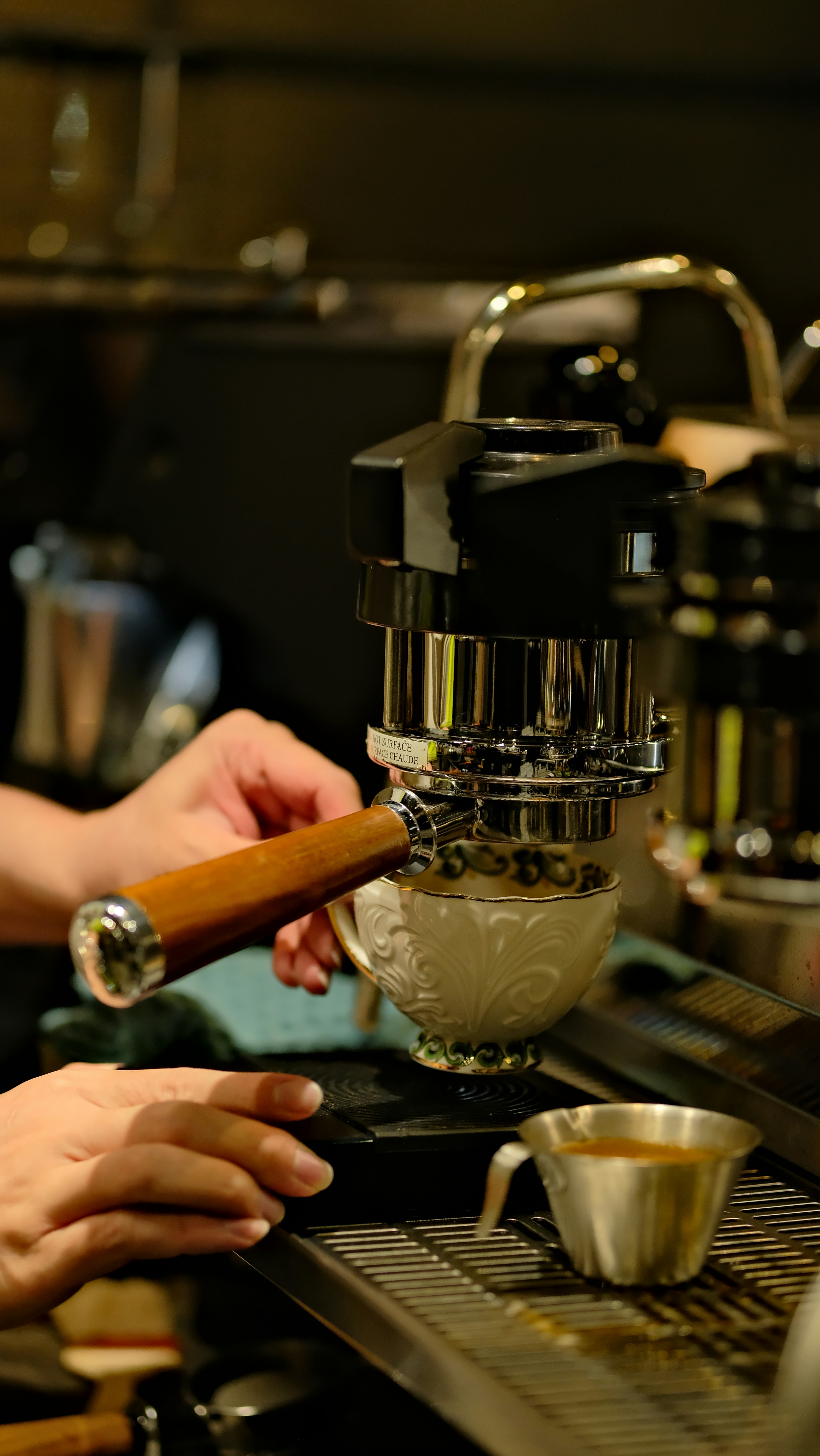 Portrait of a Barista's Precision: Espresso Craft Under Warm Copper Lights