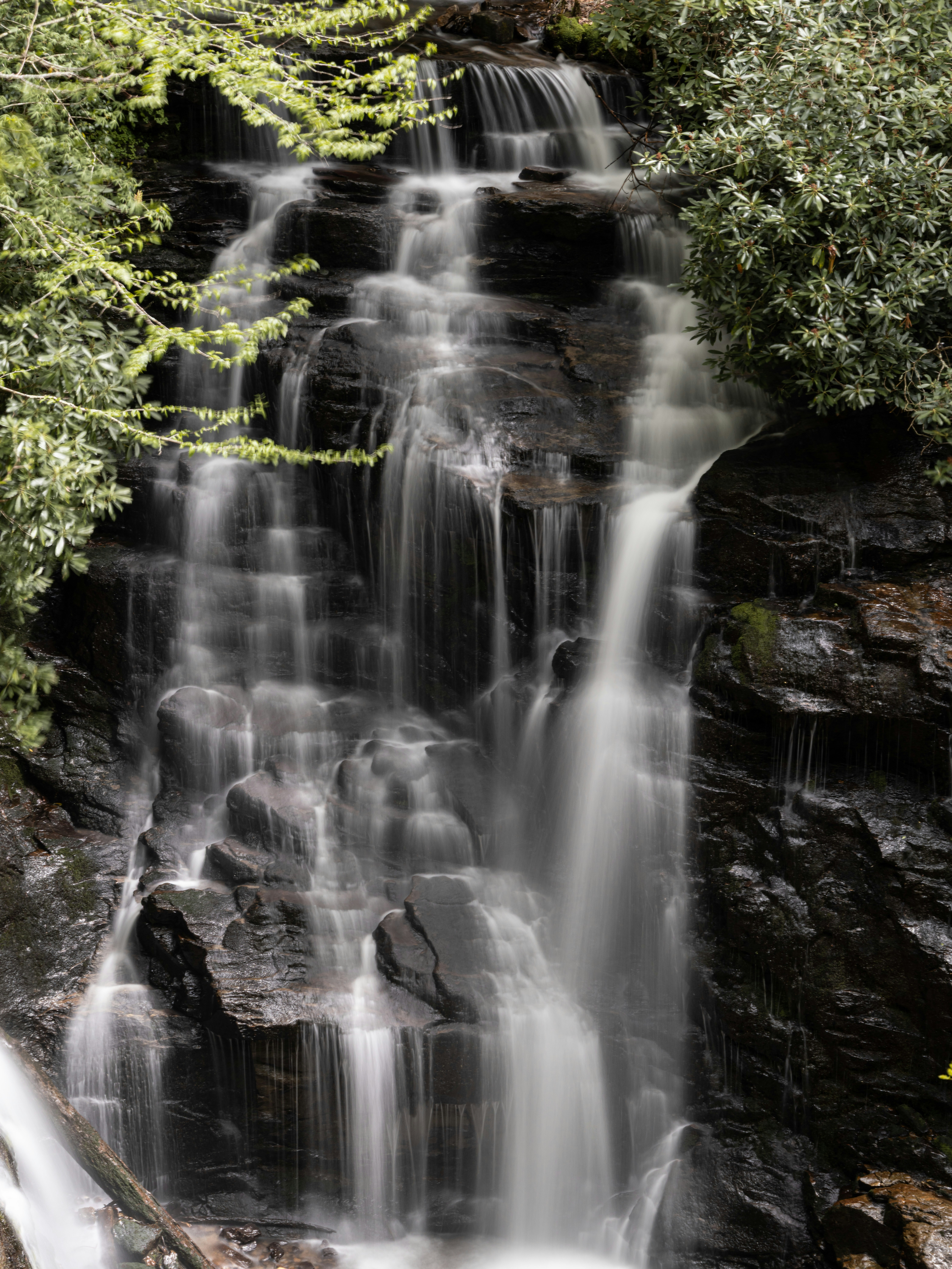 Cascade Veil: A Quiet Descent Through Dark Stone