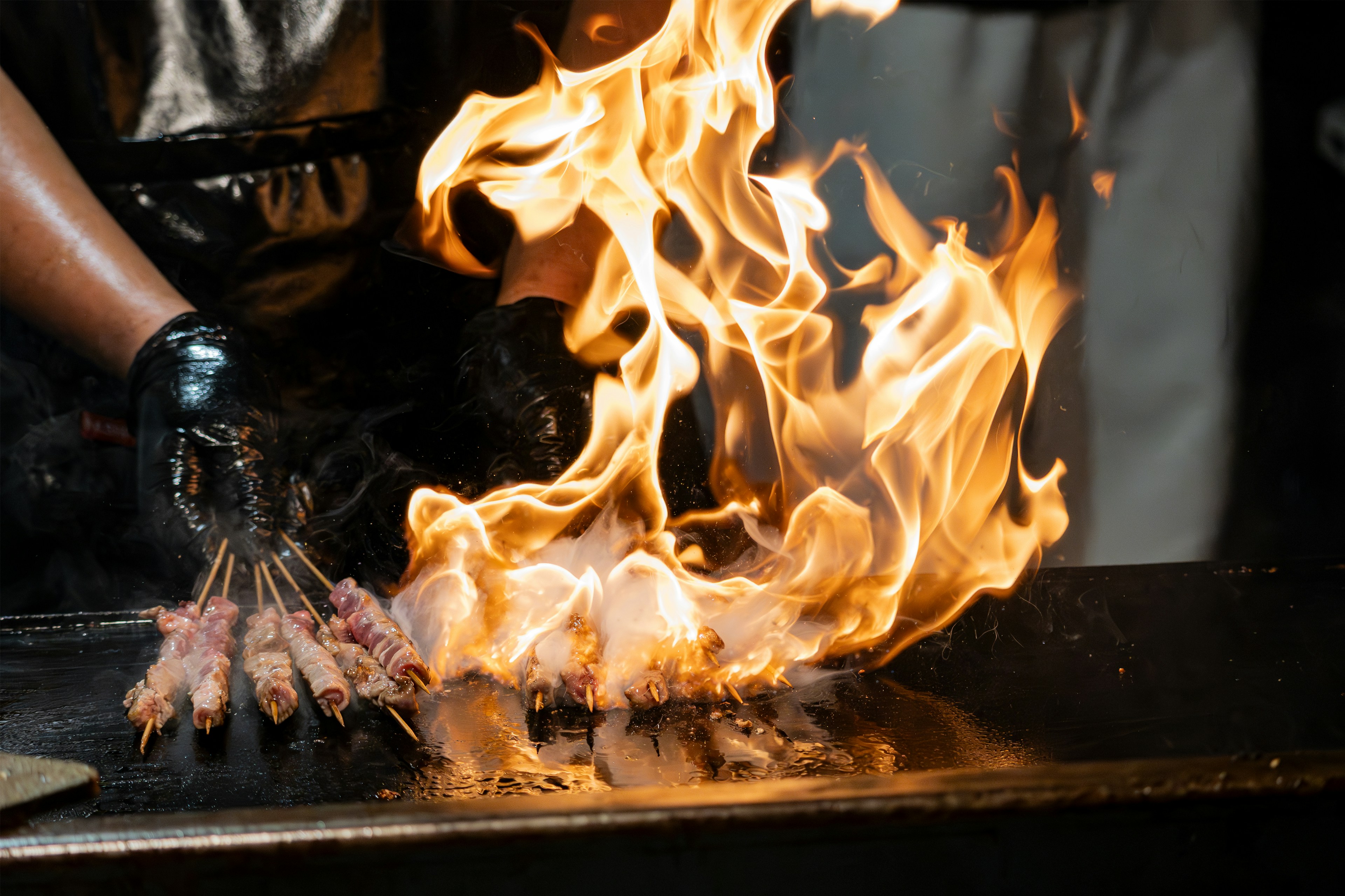 Flames Guarding Skewers on a Grilling Shoot