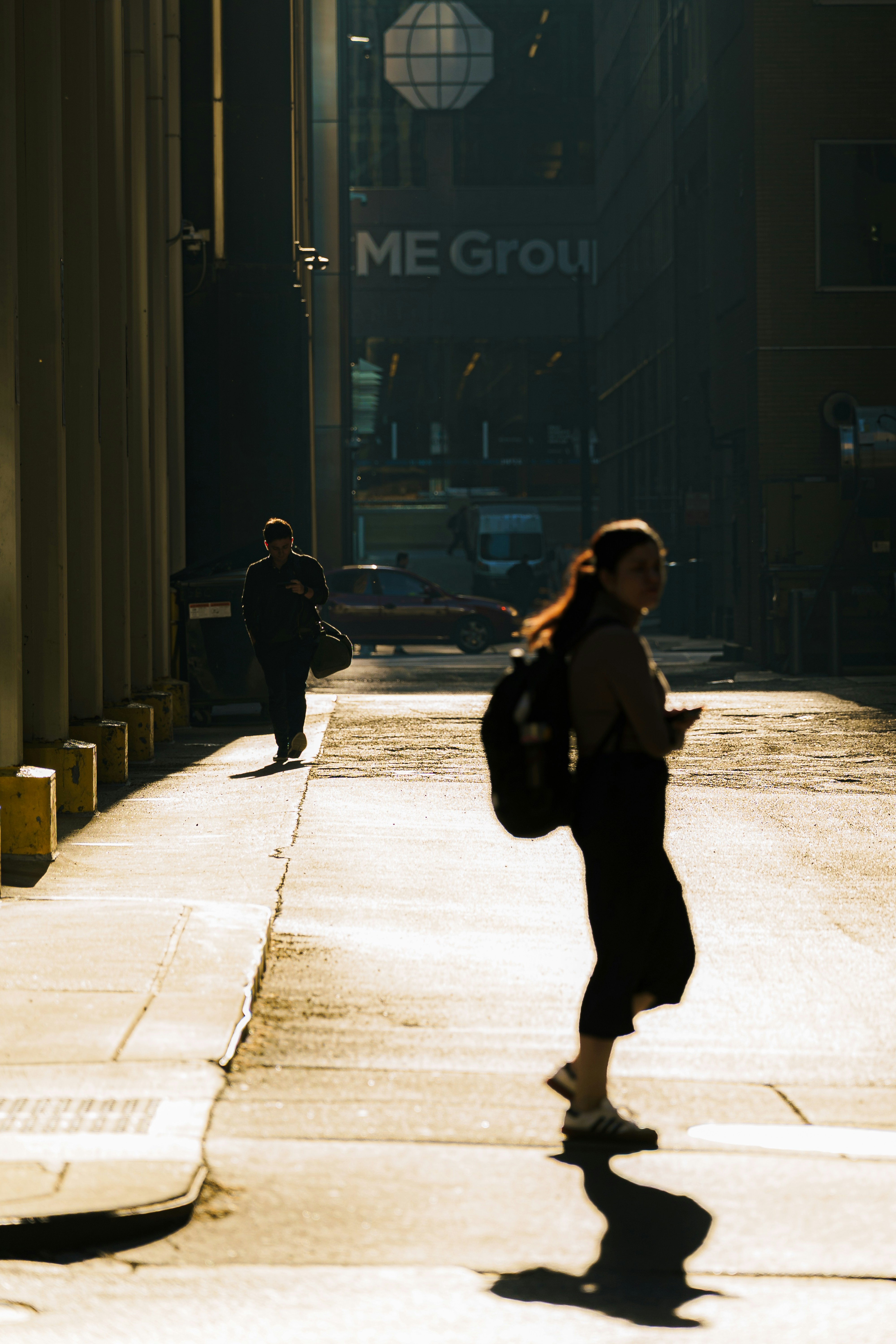 Crossing Shadows: A Street Portrait in Winter Light