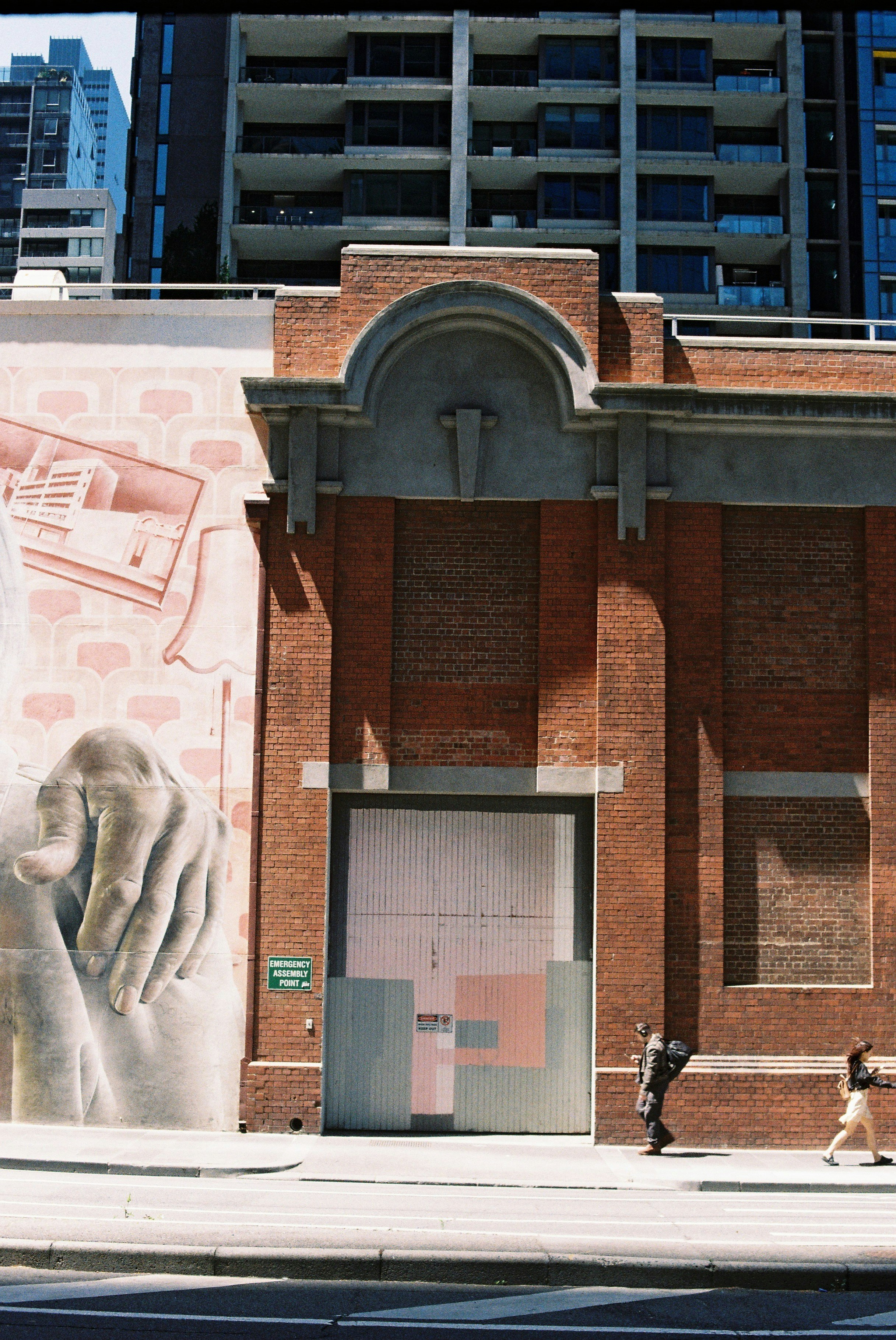 Brick Archway and Street Graffiti: A City Rencontre