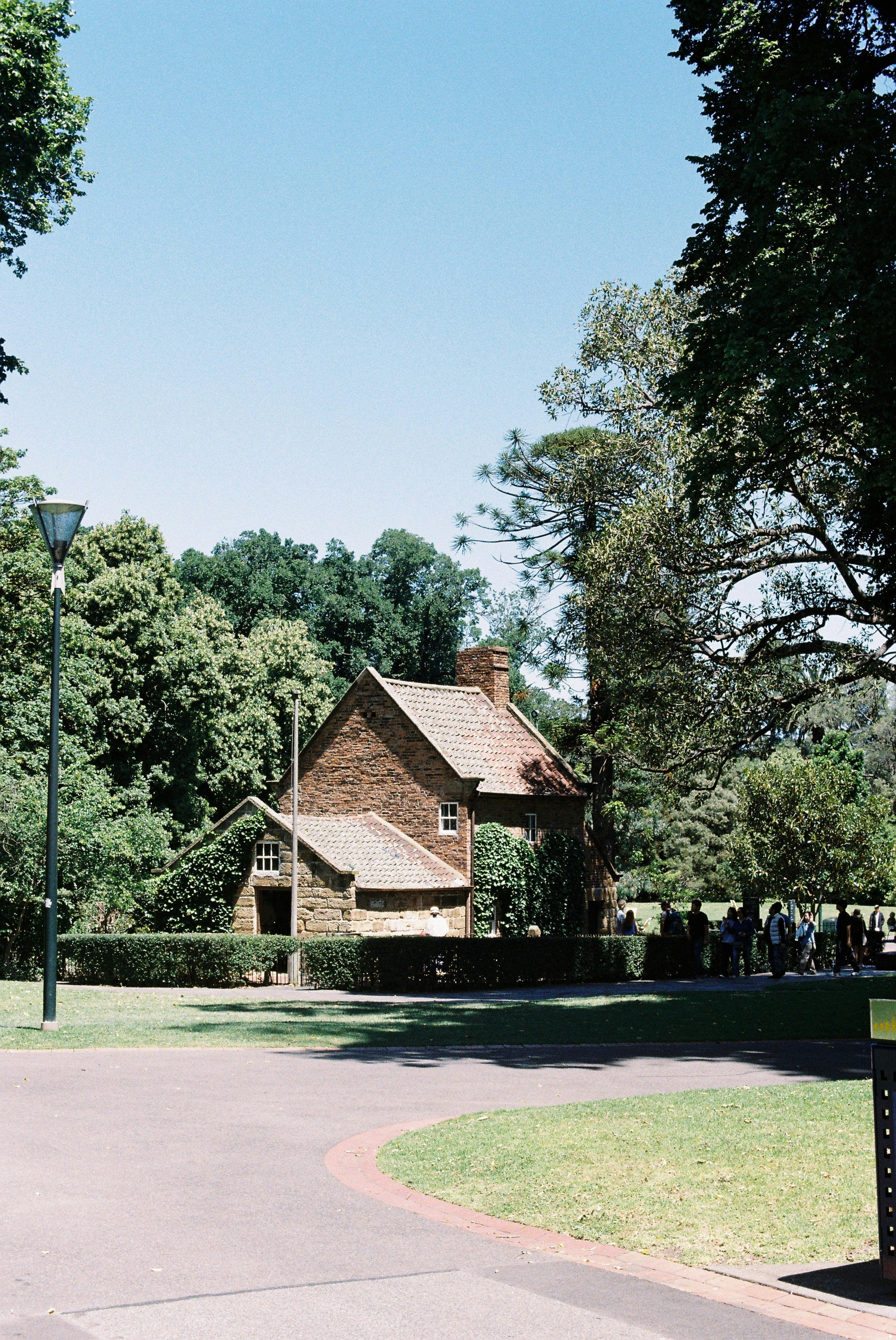 Sunlit Brick Cottage Amid a Quiet Park