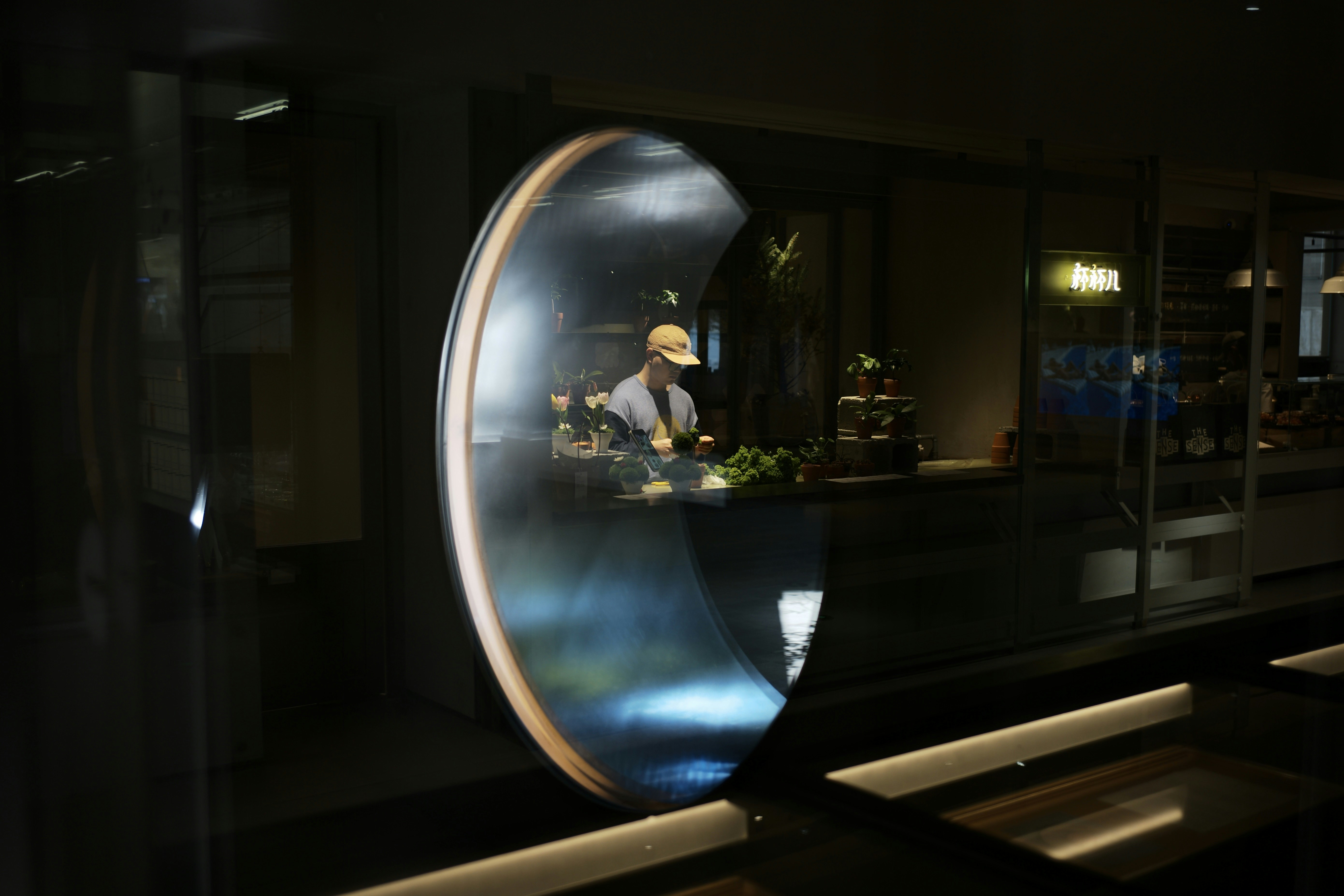 Circular Studio Through a Glowing Portal