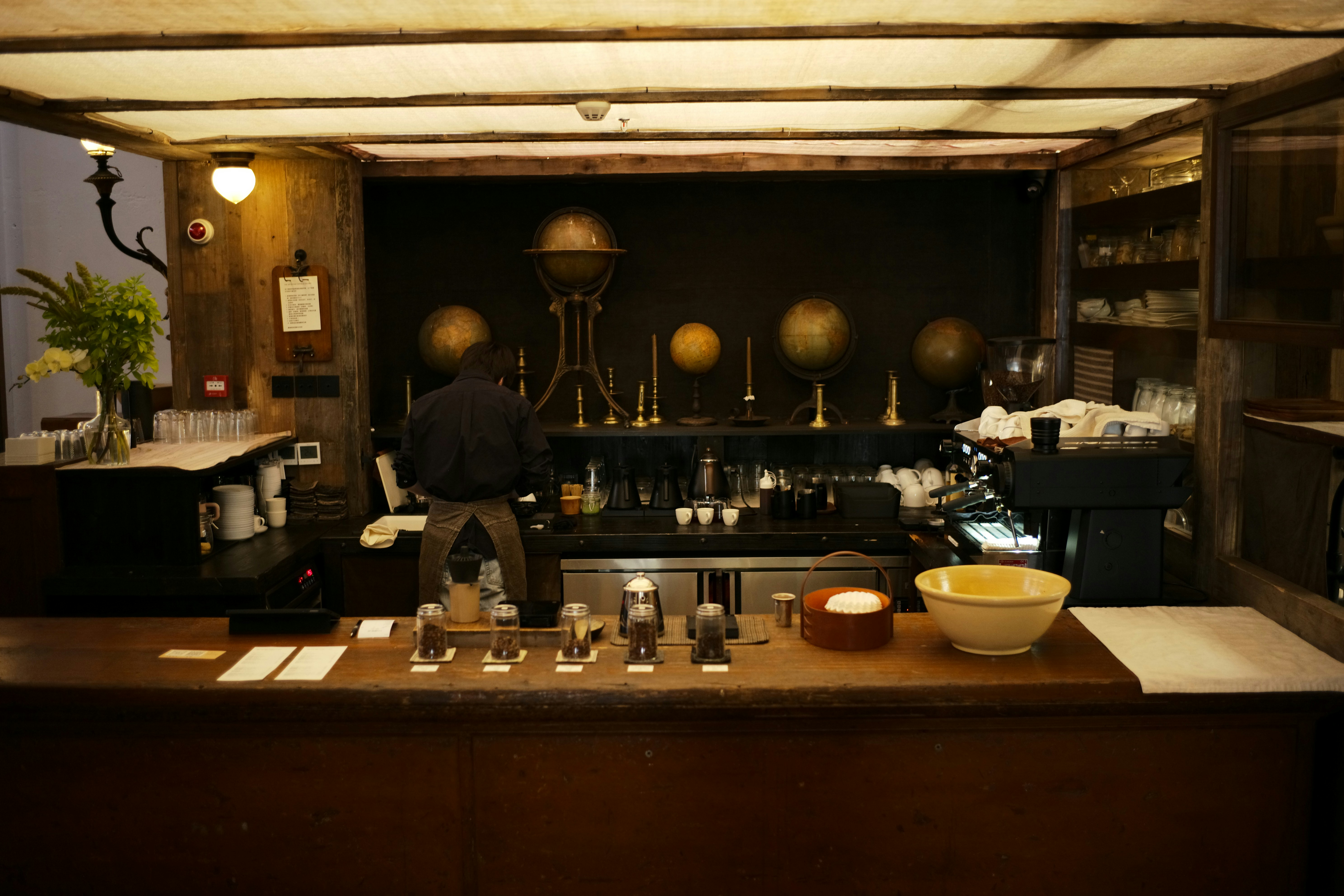 Hushed Barroom Study: Globes and Ghosts of the Globe