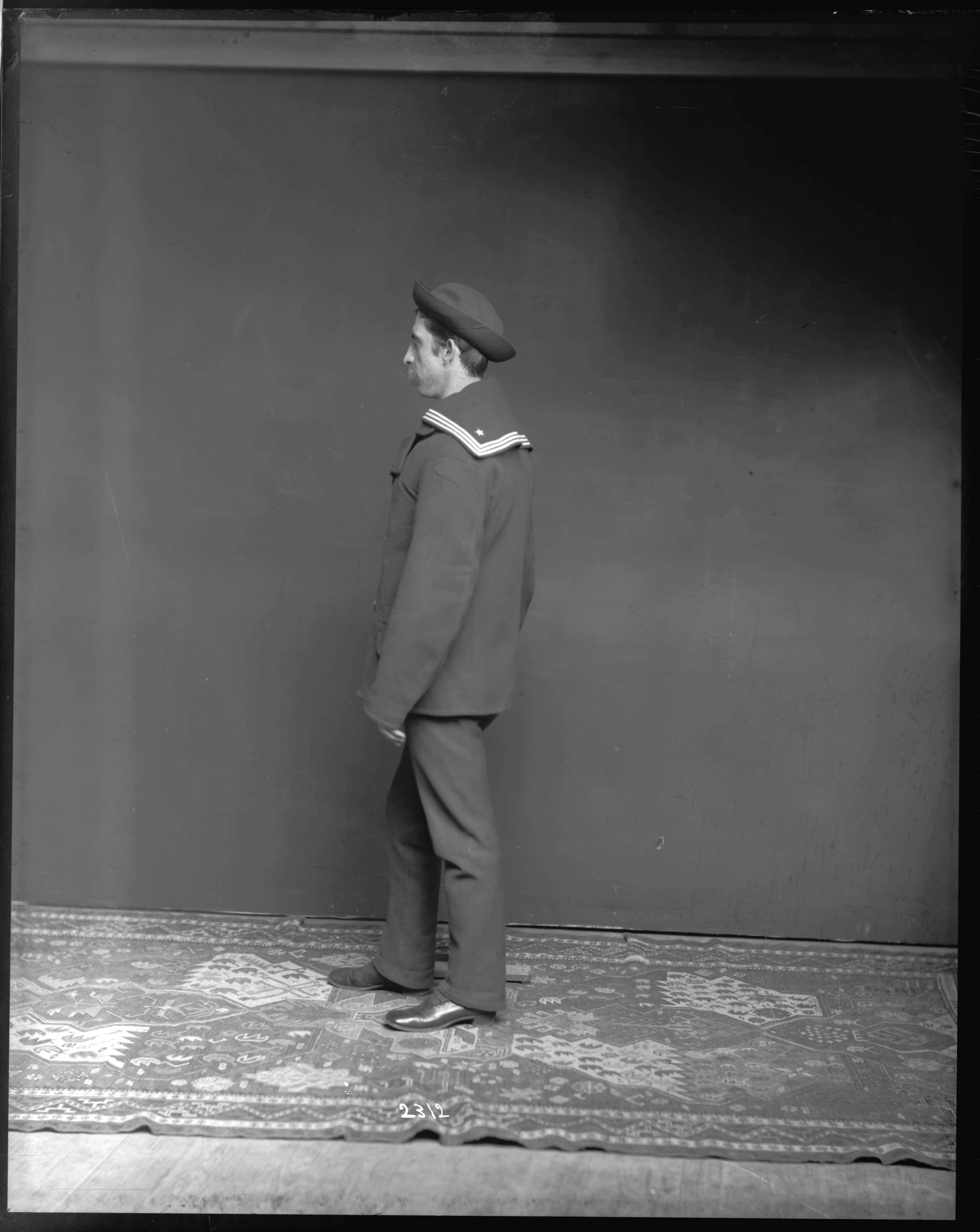 Unidentified Man Models U.S. Navy Uniform, Side View. c 1880s From 8" x 10" glass negative. Record ID siris_arc_385244