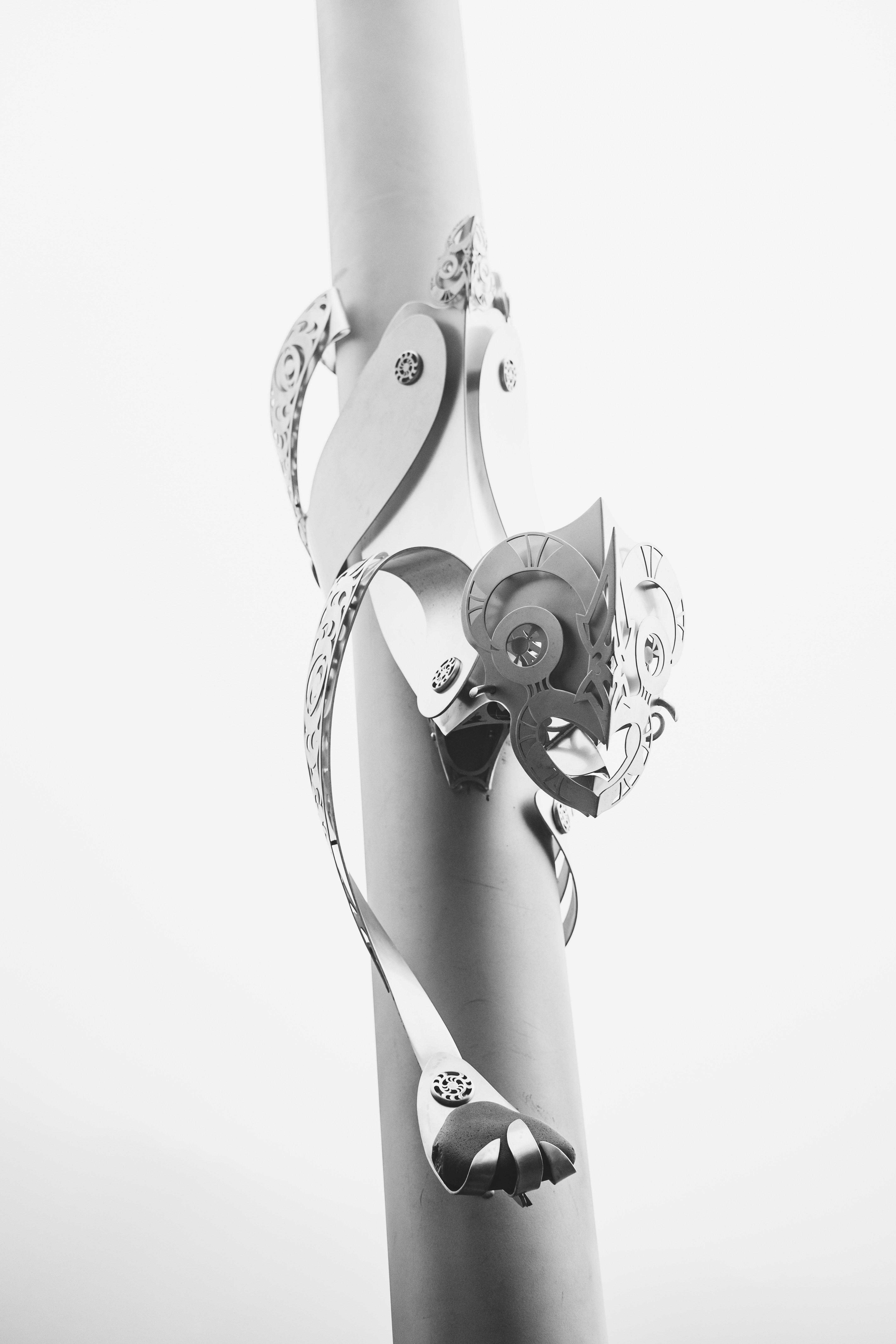 Minimalist Studio Sculpt: Metal Ornaments on a Smooth Twist