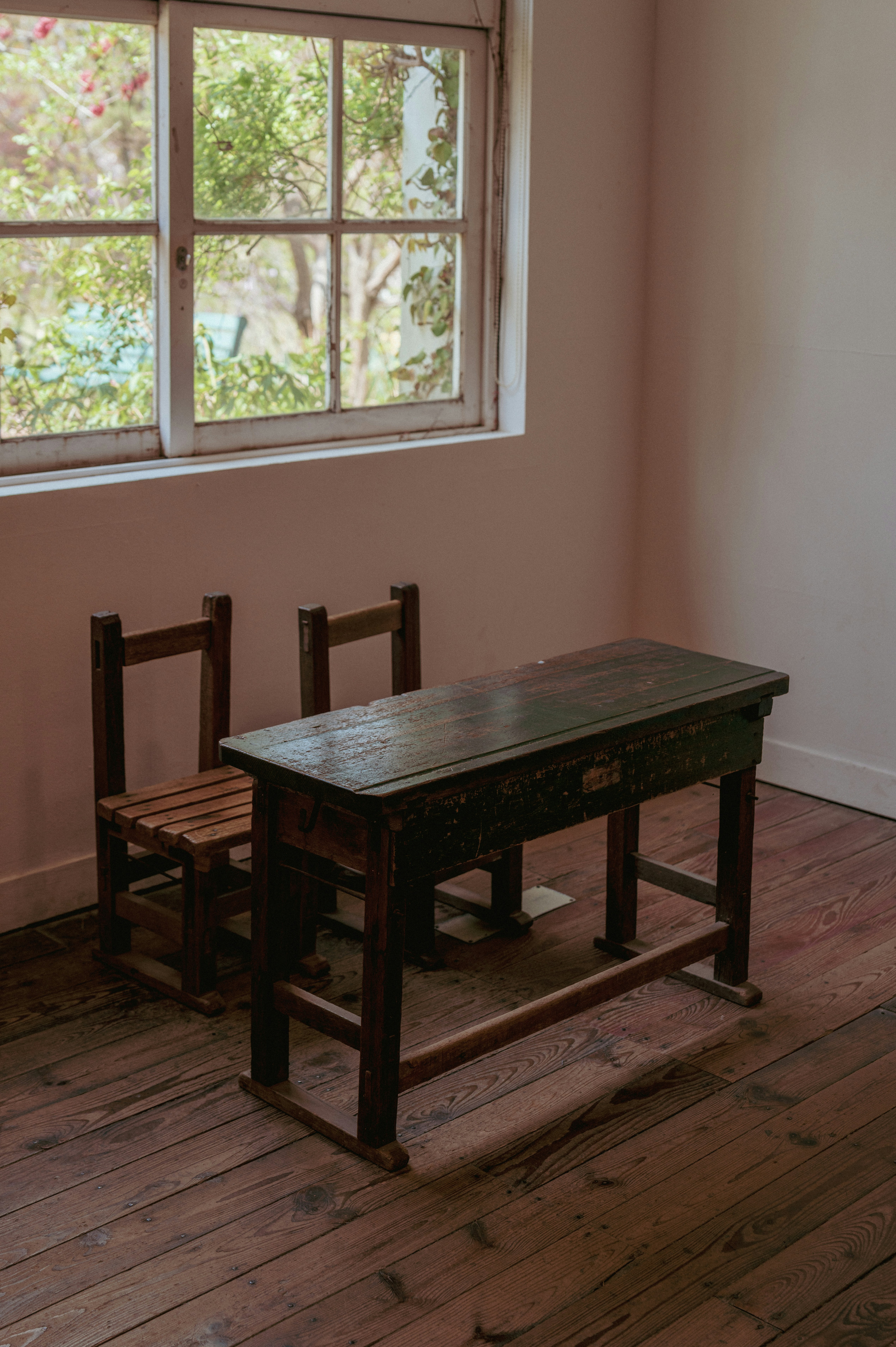 Quiet Corner: A Vintage Desk Steeped in Morning Light