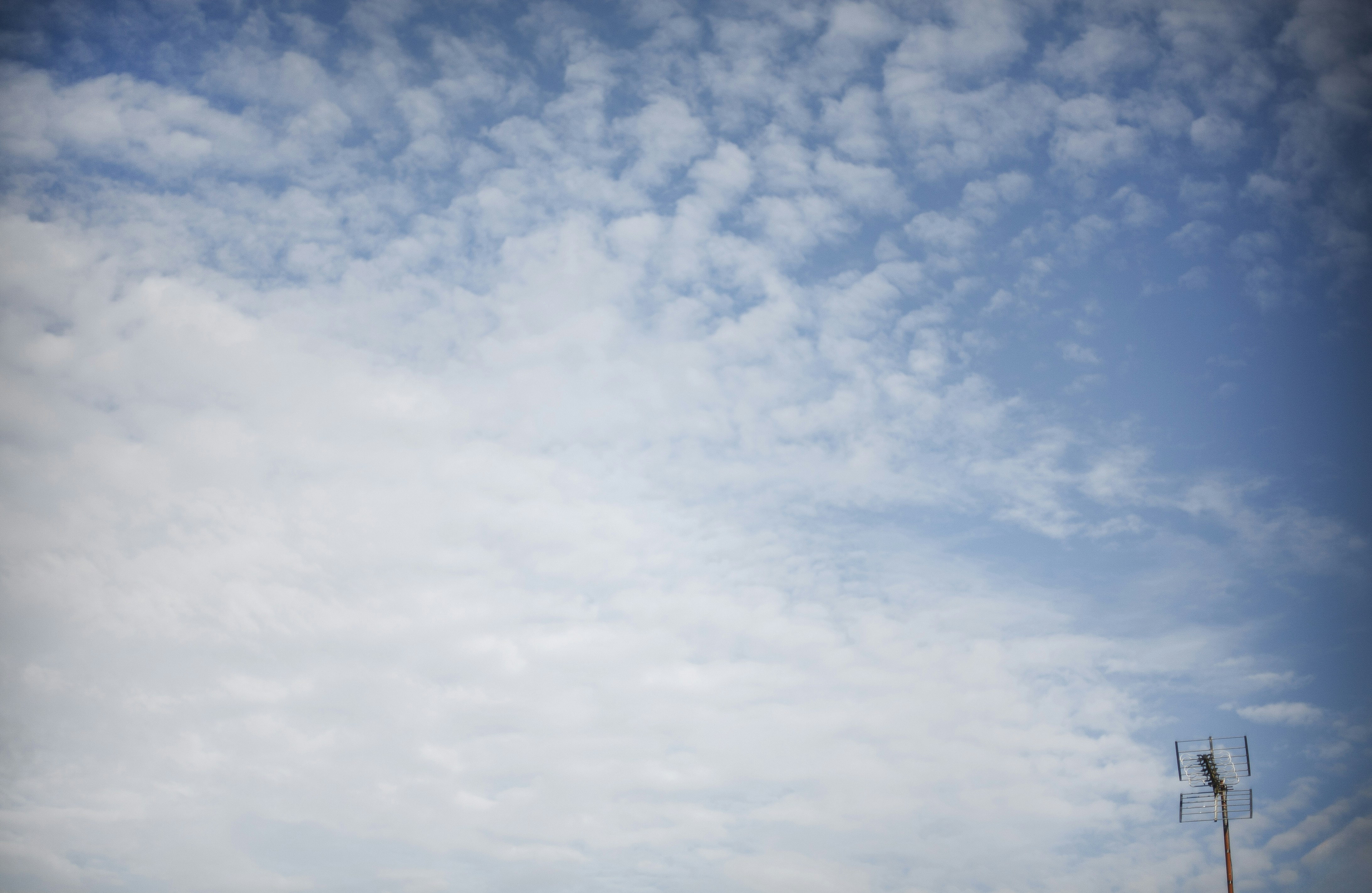 Sky Ledger: A Broadband Quilt of Clouds Over a Minimal Horizon