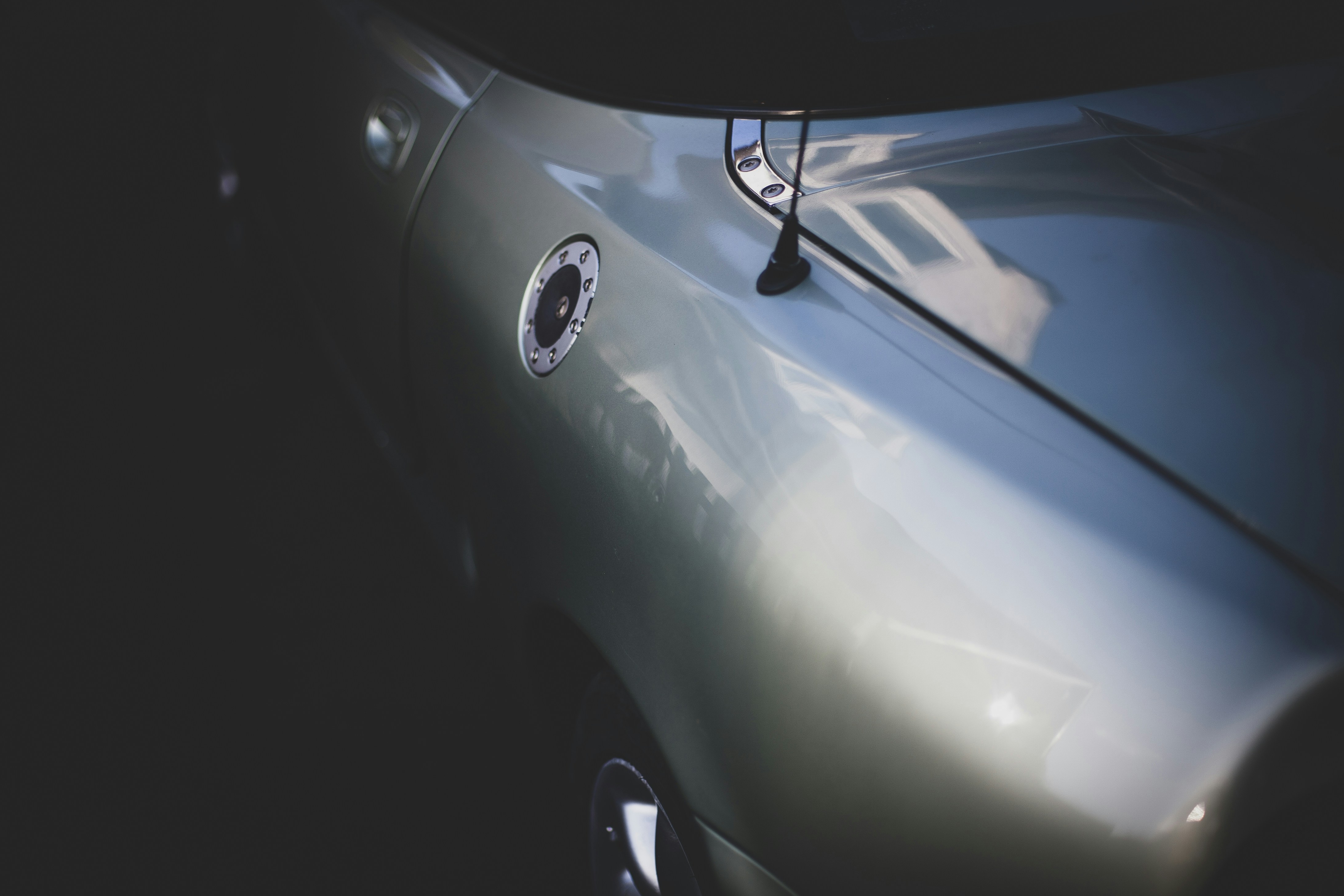 Pastel Curves: A Quiet Twist of Light on a Vintage Car