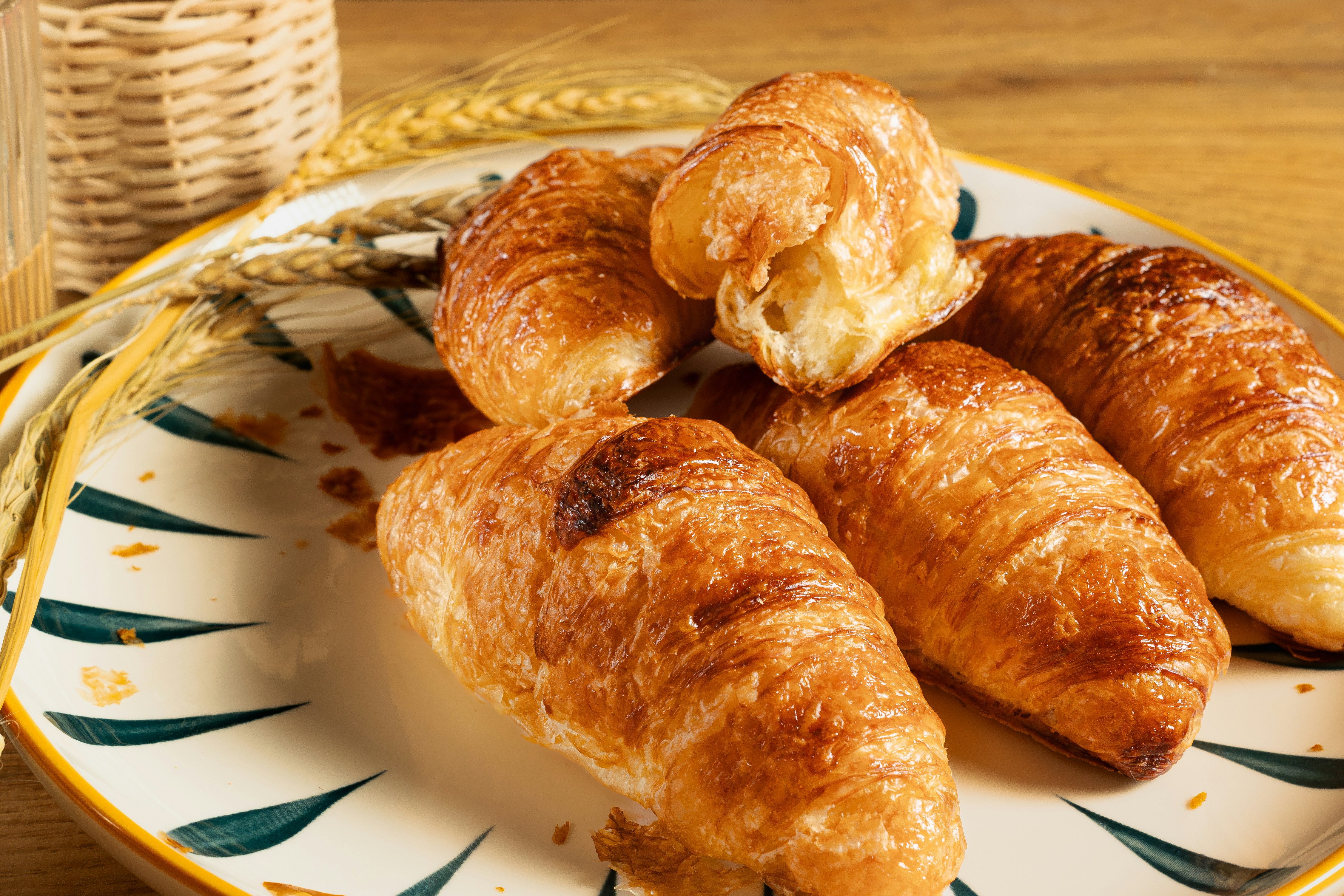 Golden Croissants on a Rustic Plate