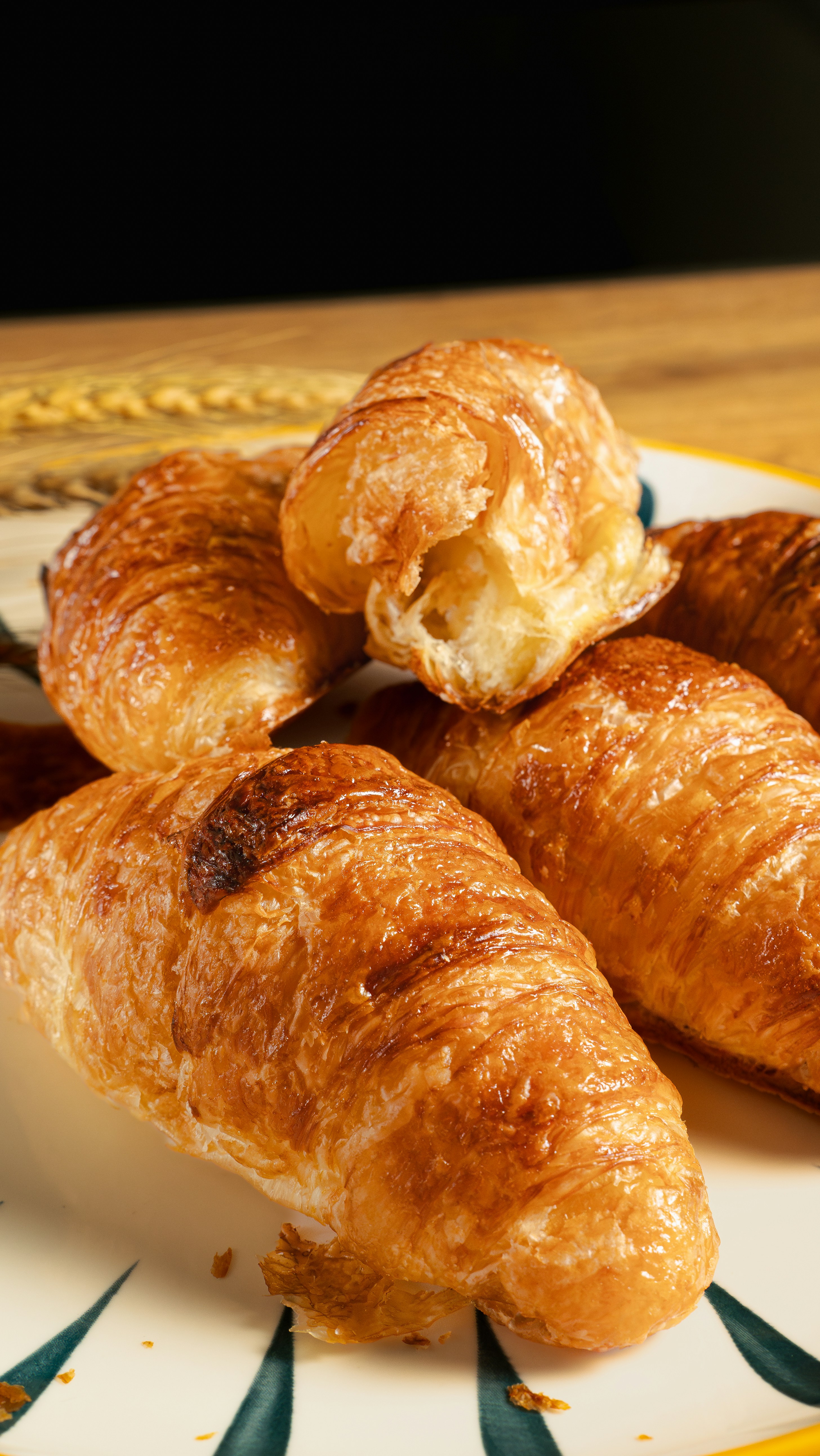 Golden crescents: a plate of buttery croissants