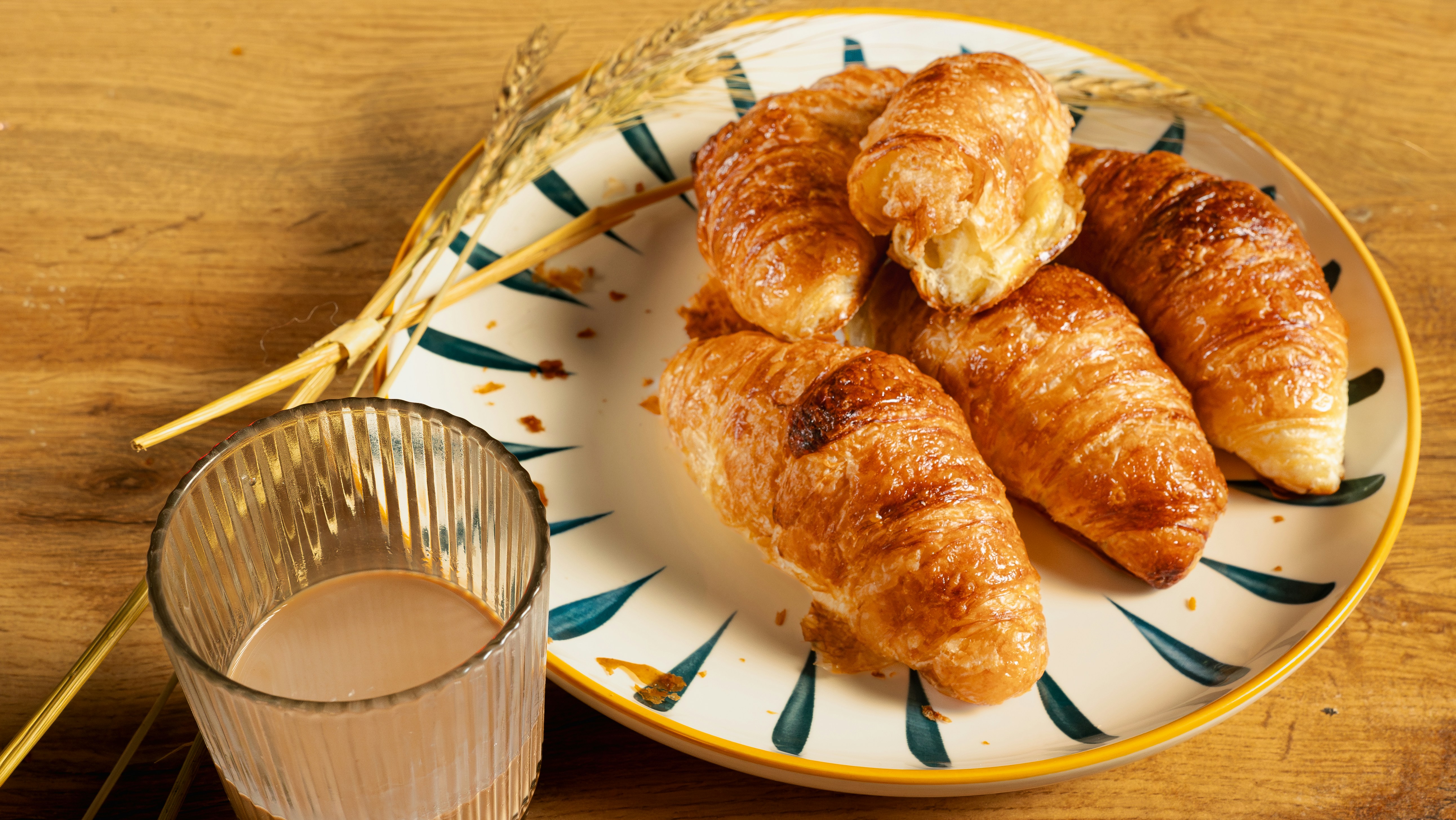 Golden Crescent: Croissants on a Rustic Plate