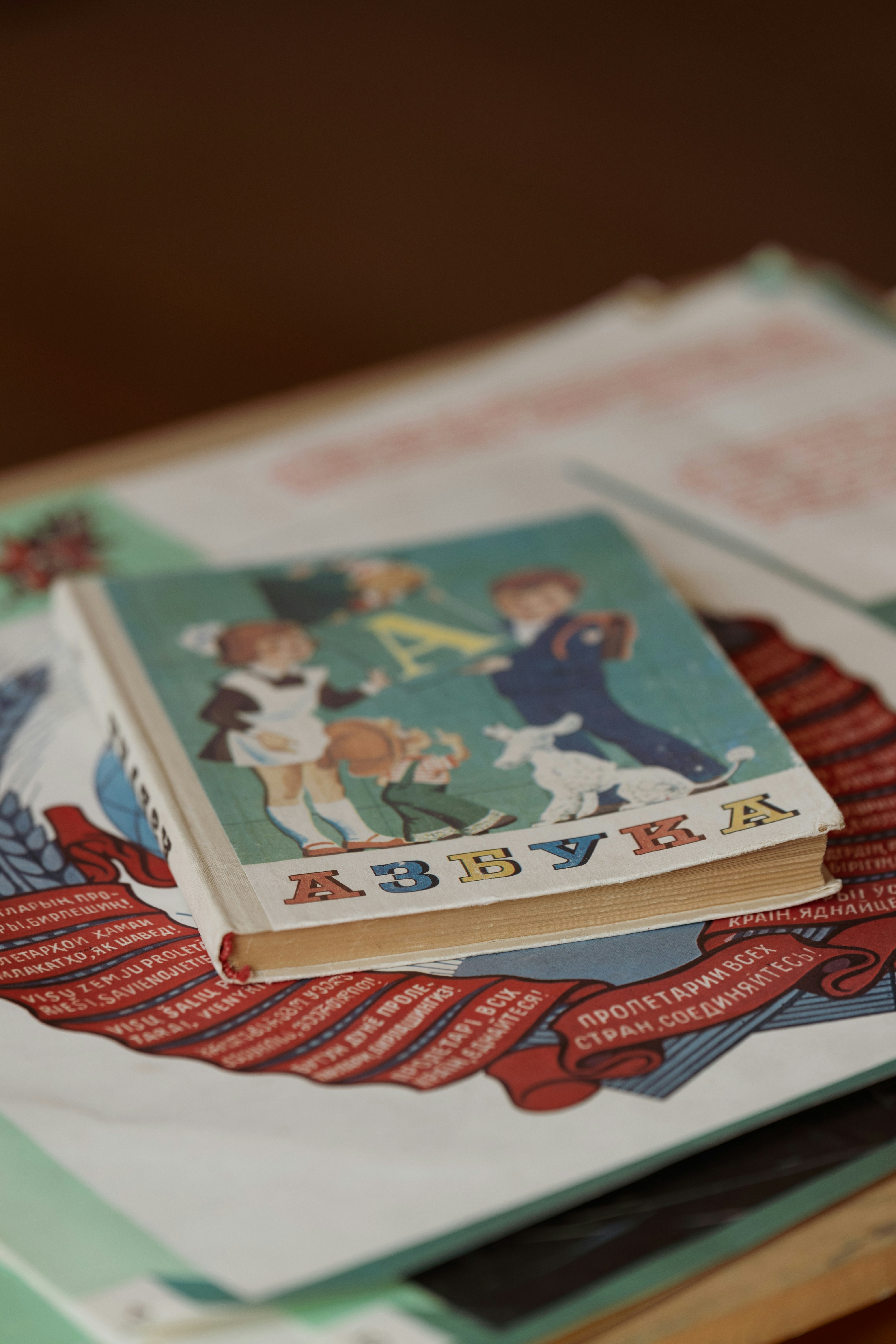 Vintage Alphabet: A Russian Children's Book on a Weathered Stack