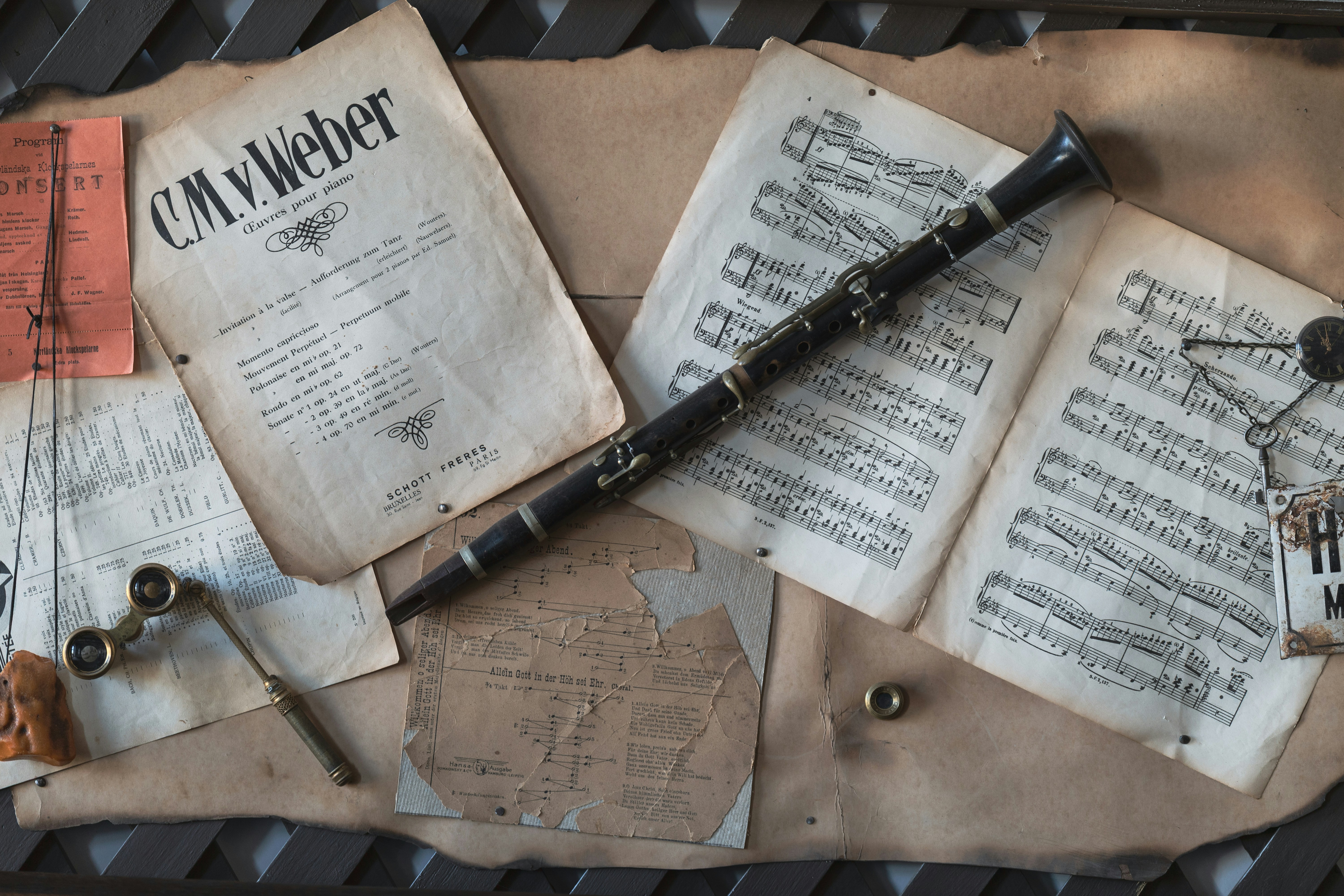 A Vintage Ensemble: Sheet Music, Reed, and Accessories Gathered for Study